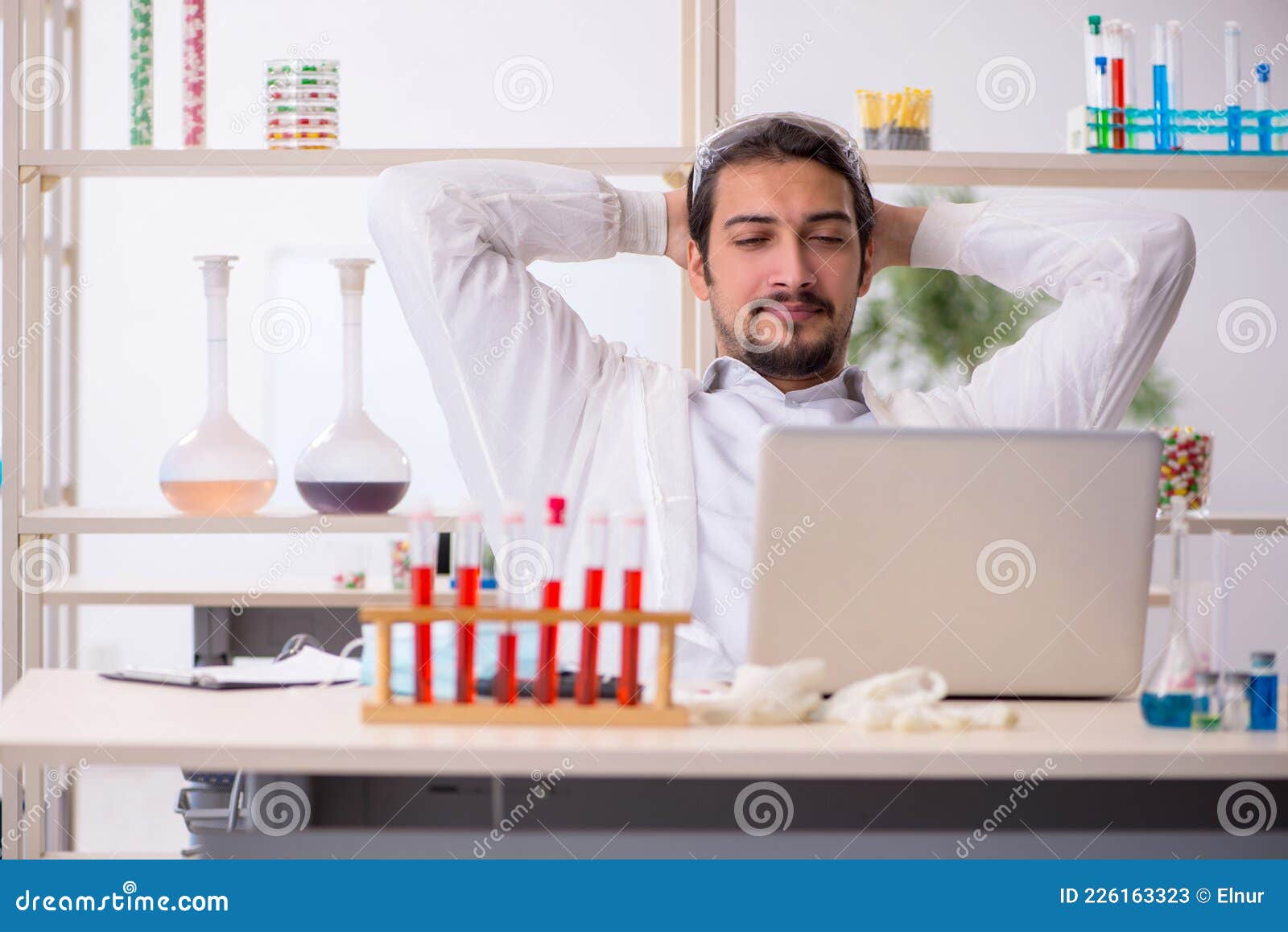 Young Male Chemist Sitting at Computer at the Lab Stock Image - Image ...