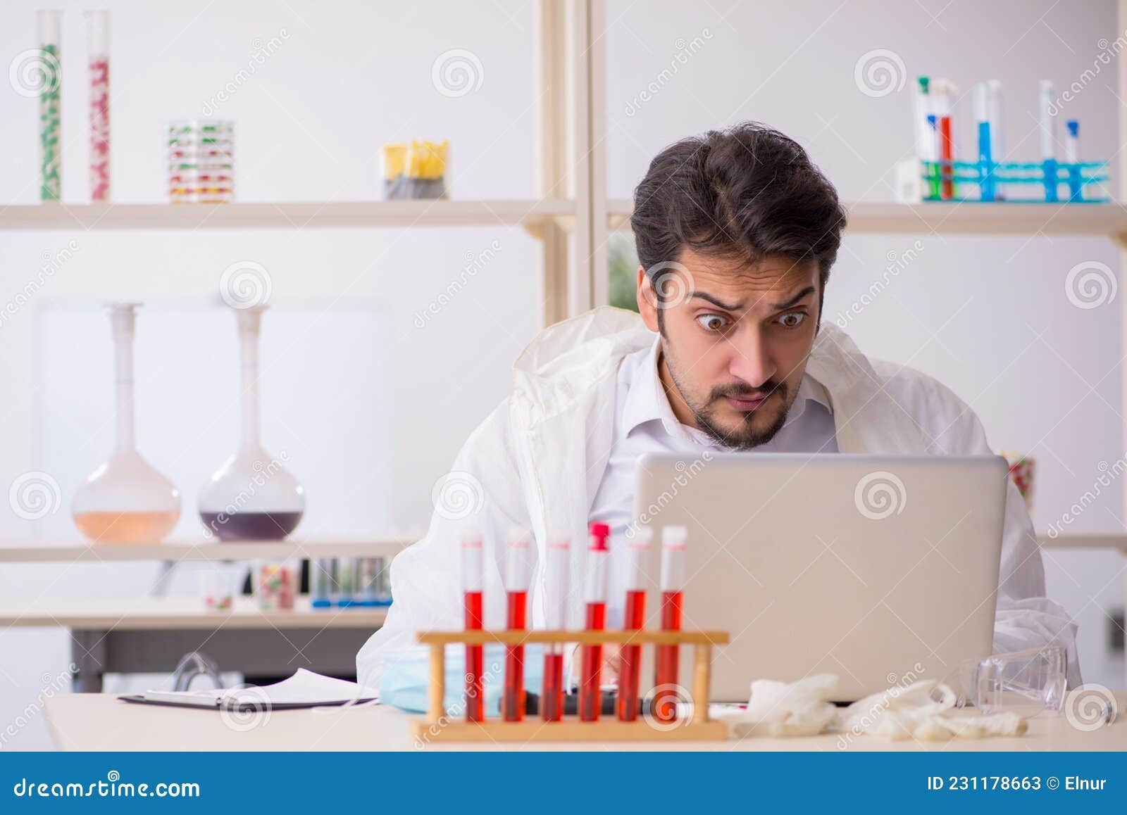 Young Male Chemist Sitting at Computer at the Lab Stock Image - Image ...