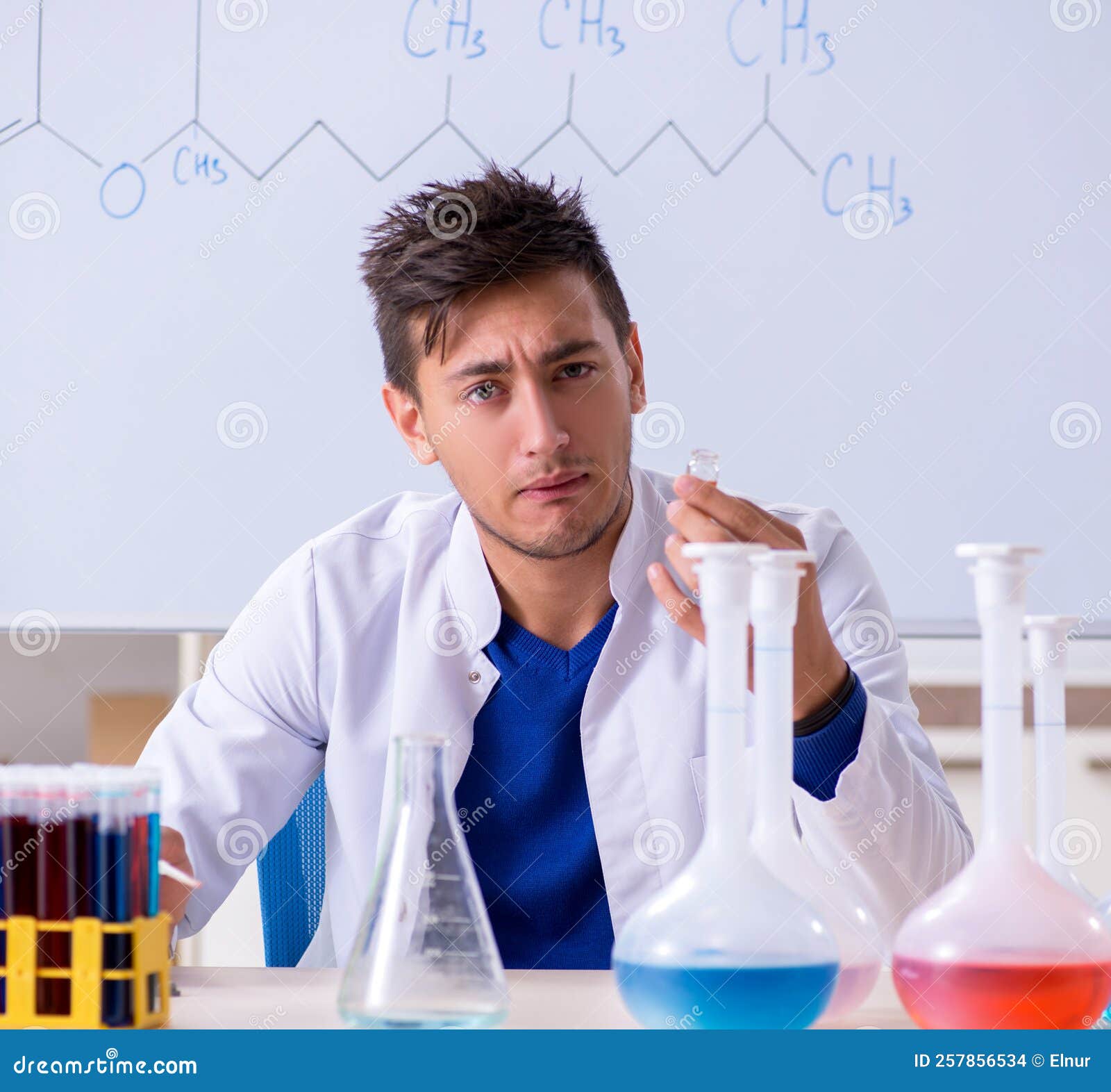 Young Chemist Sitting in the Lab Stock Photo - Image of glass, board ...