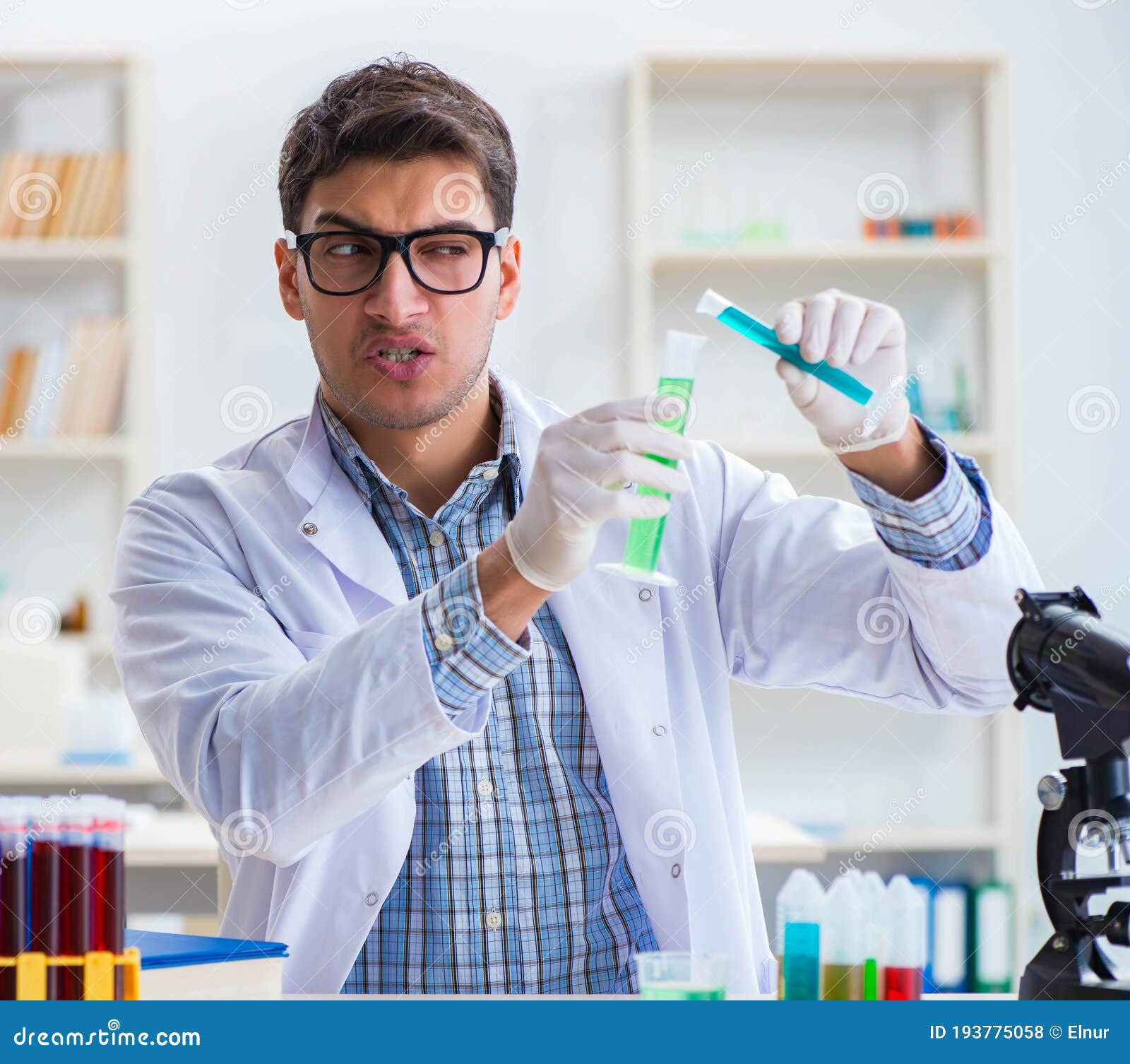Young Chemist Student Working in Lab on Chemicals Stock Photo - Image ...