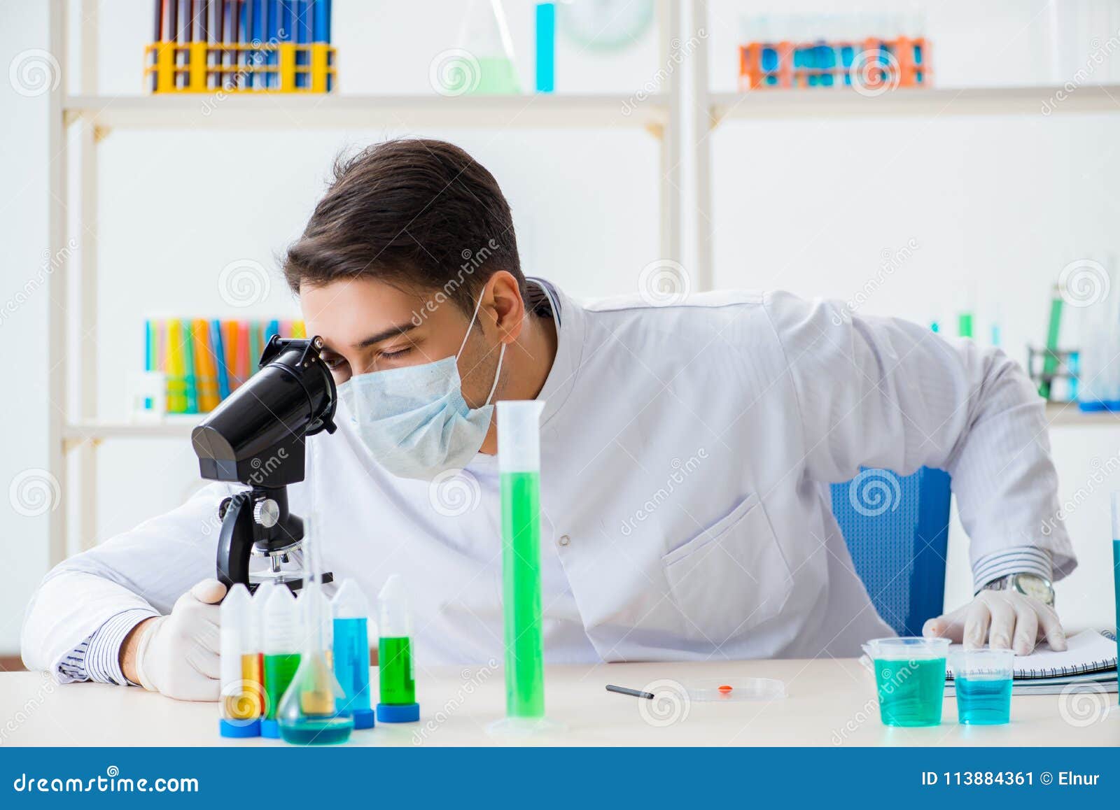 The Young Chemist Student Working in Lab on Chemicals Stock Image ...