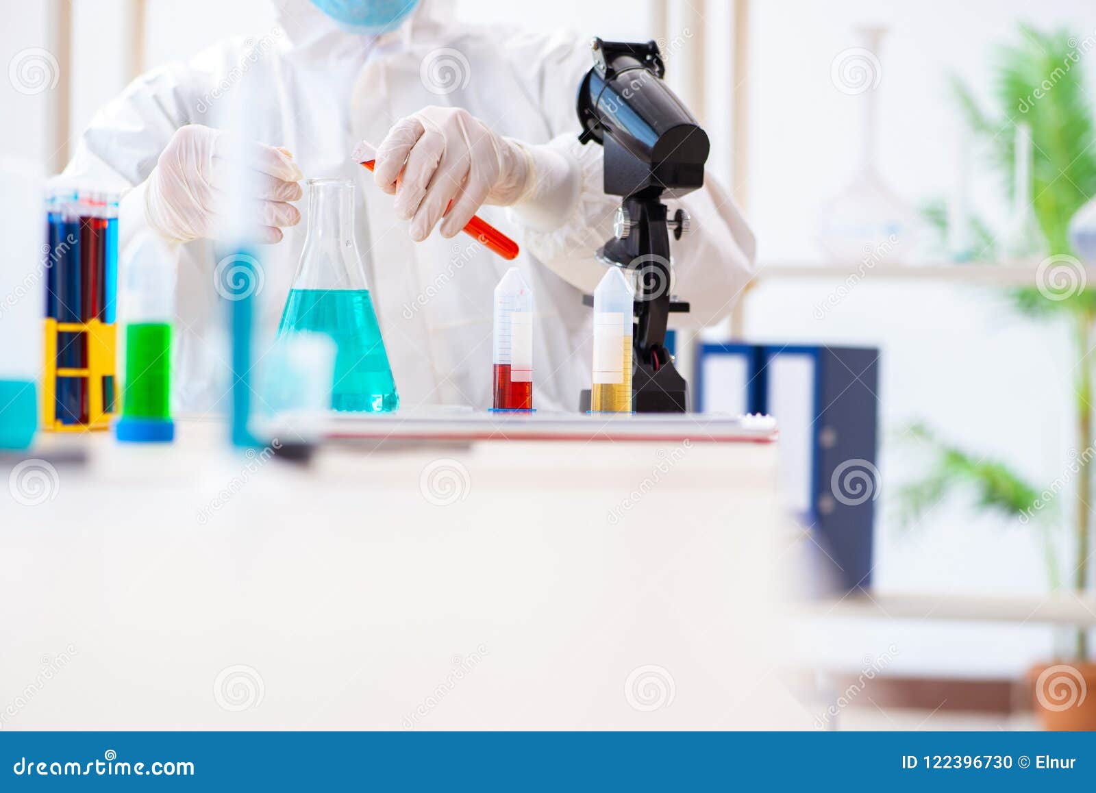 The Young Chemist Student Working in Lab on Chemicals Stock Photo ...
