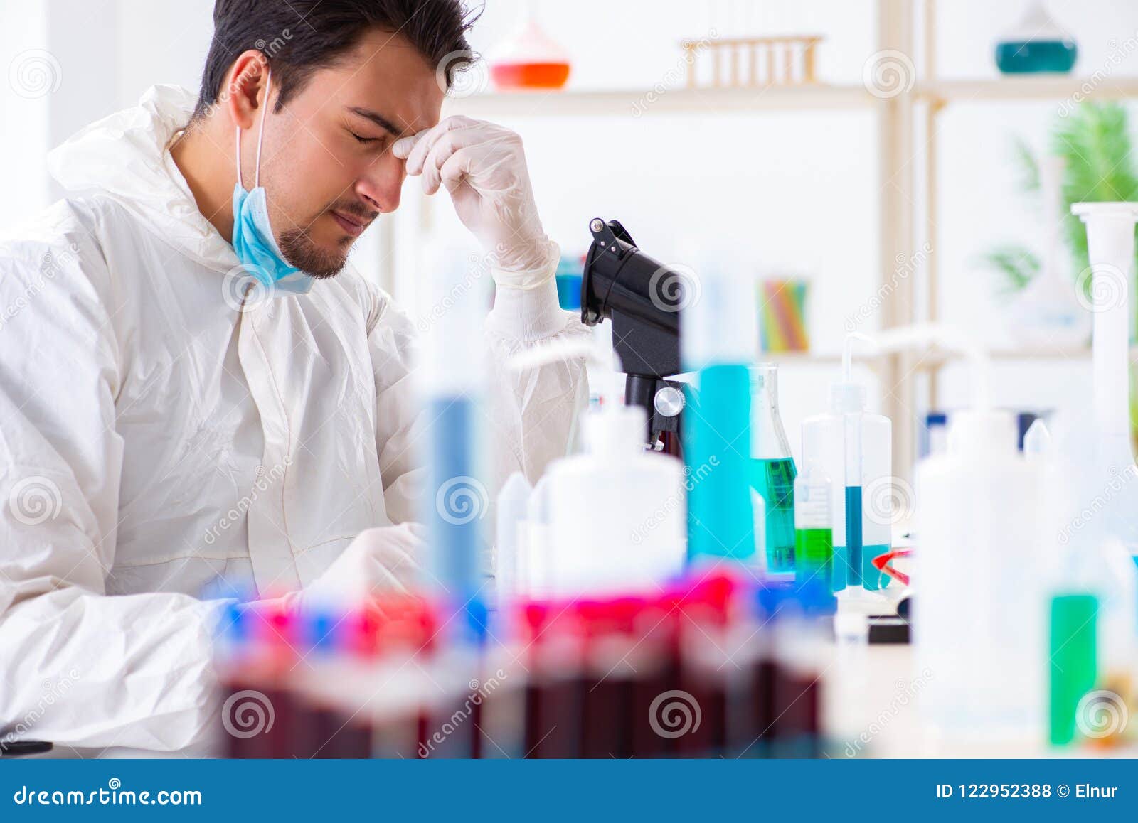 The Young Chemist Student Working in Lab on Chemicals Stock Photo ...