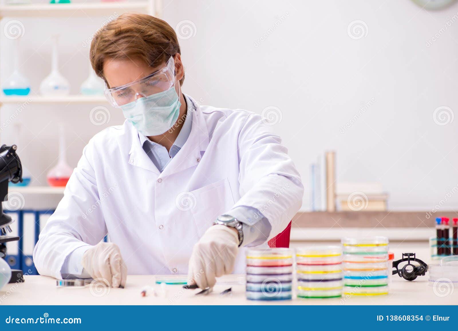 The Young Chemist Working in the Lab Stock Photo - Image of microscope ...