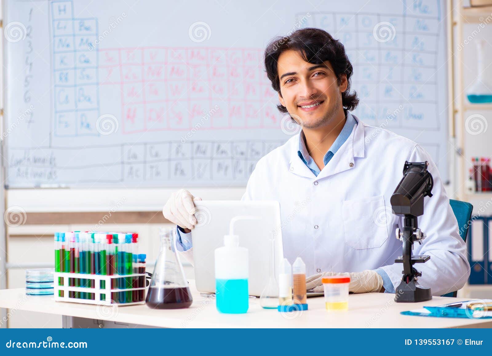 The Young Chemist Working in the Lab Stock Image - Image of online ...
