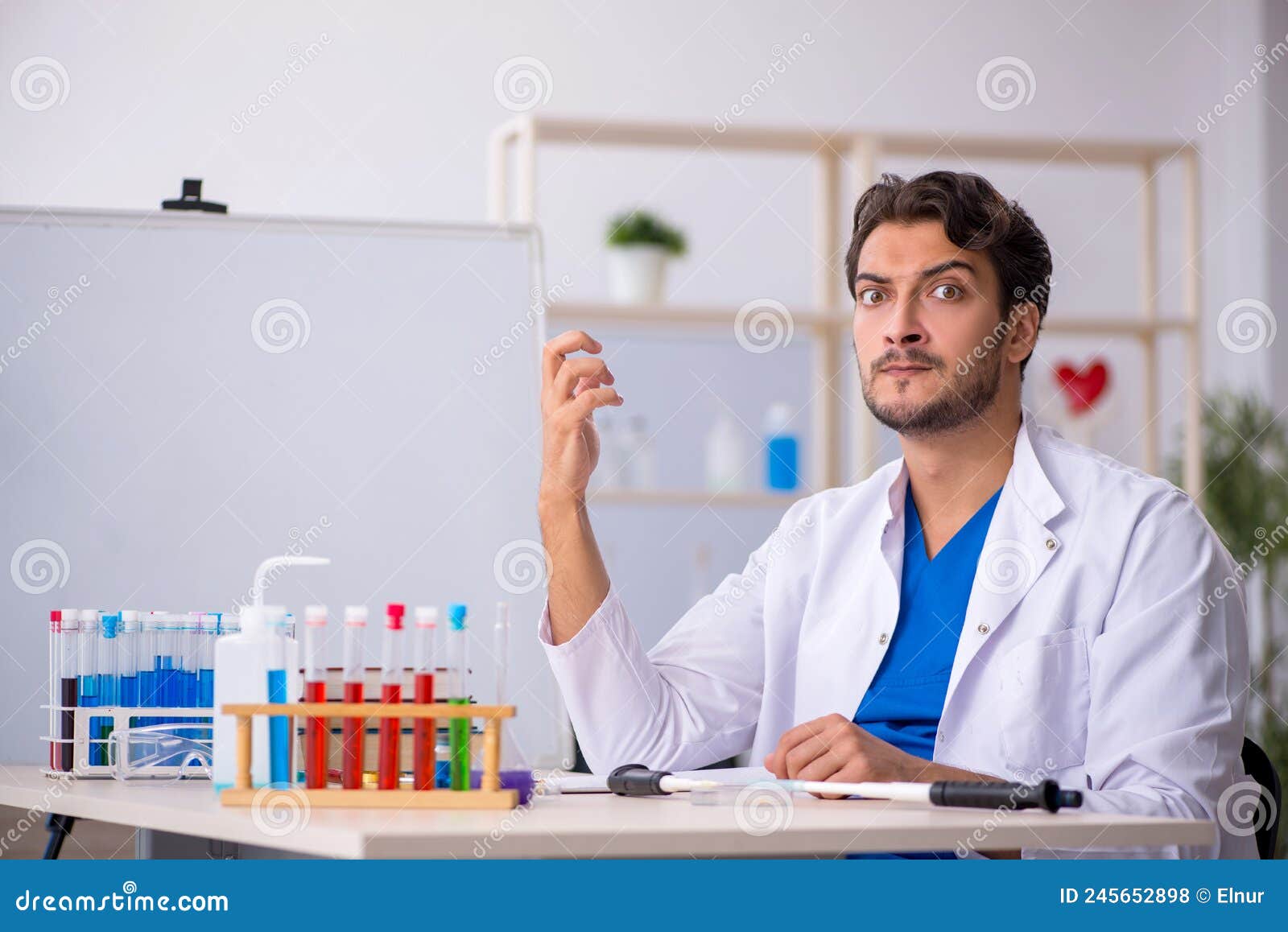 Young Male Chemist Working at the Lab Stock Photo - Image of studying ...