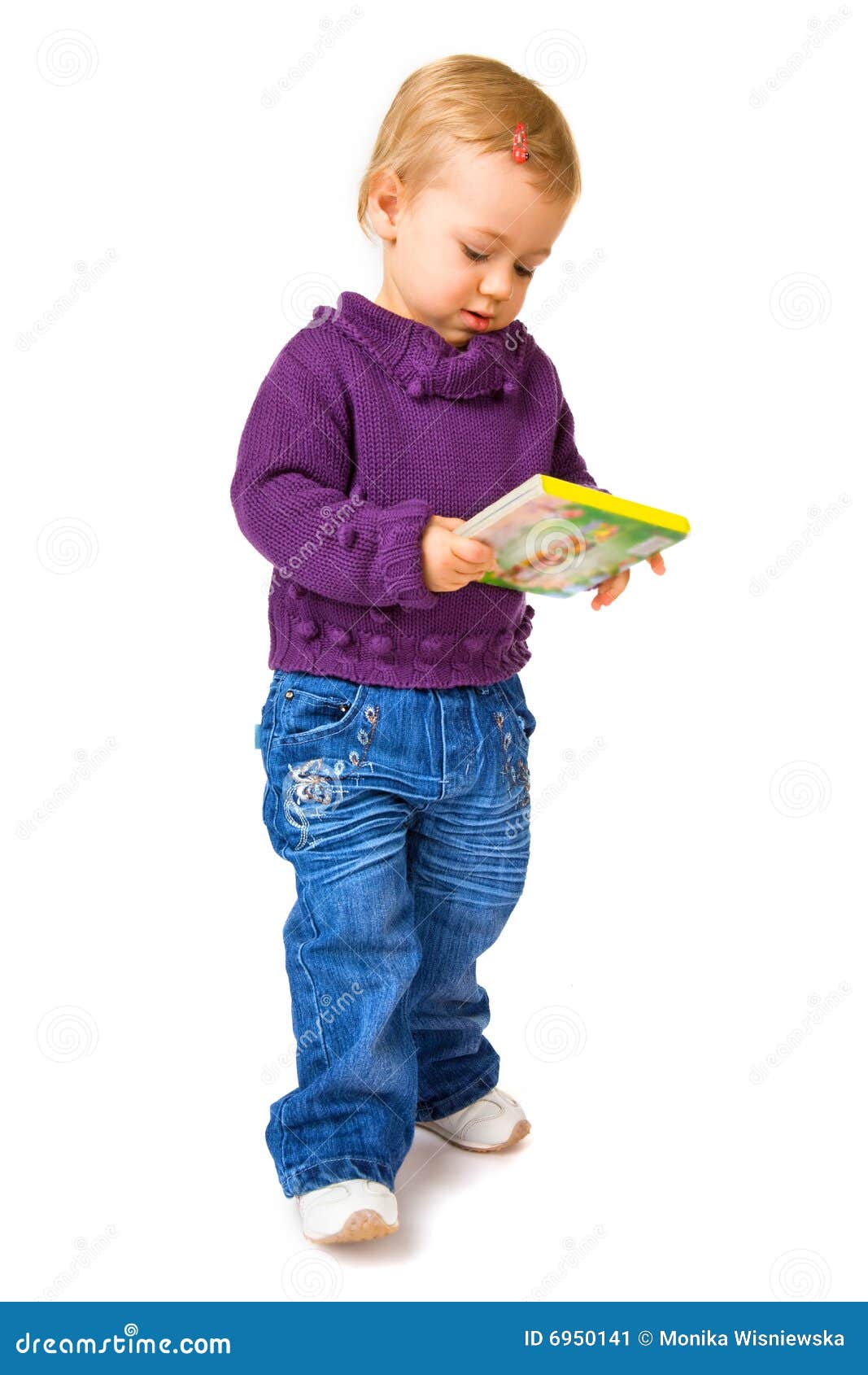 Young Child with a Book stock image. Image of casual, isolated - 6950141