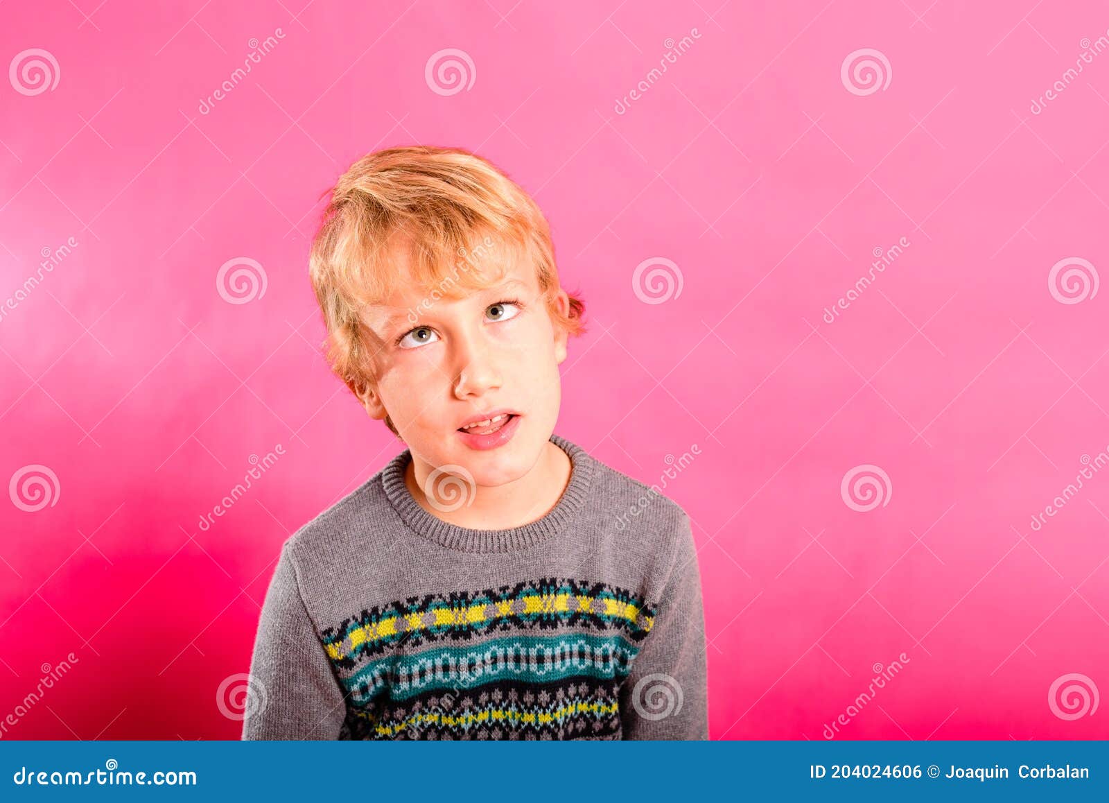 Young Child Boy Making Strange Faces, Rolling His Eyes in a Grotesque ...