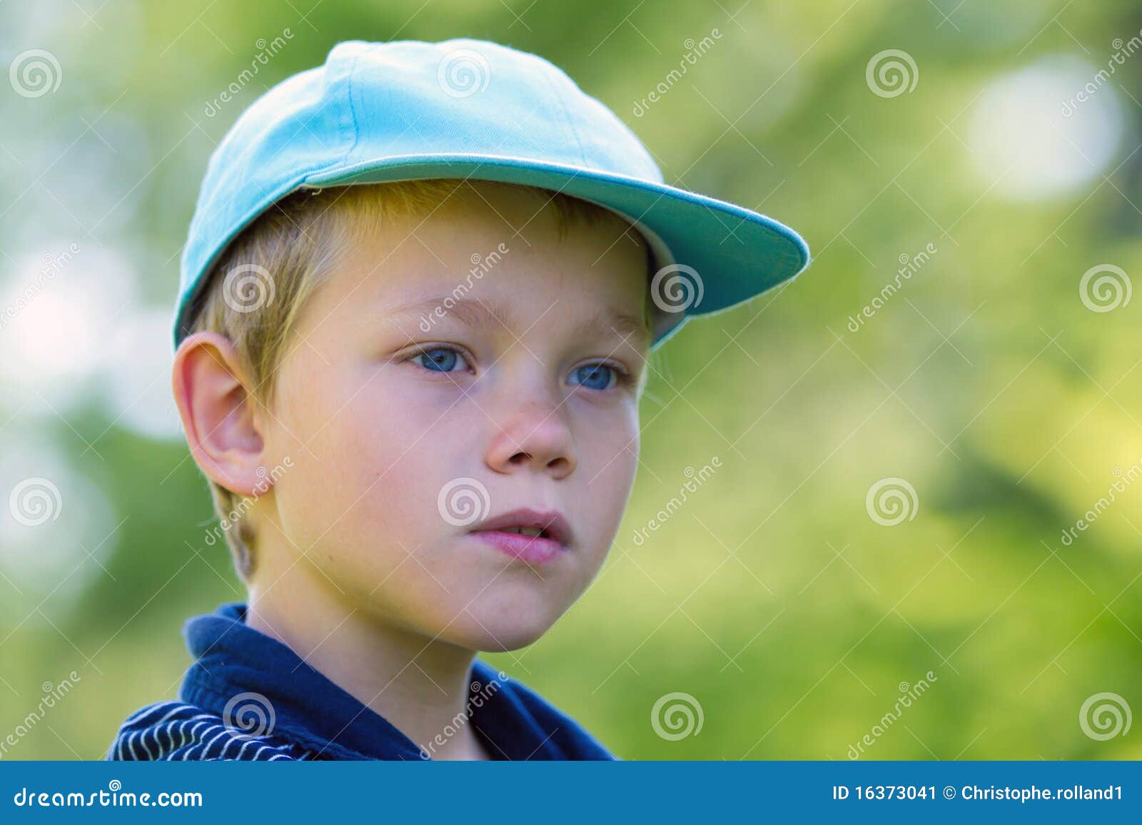 Young child with a cap stock image. Image of youth, blue - 16373041