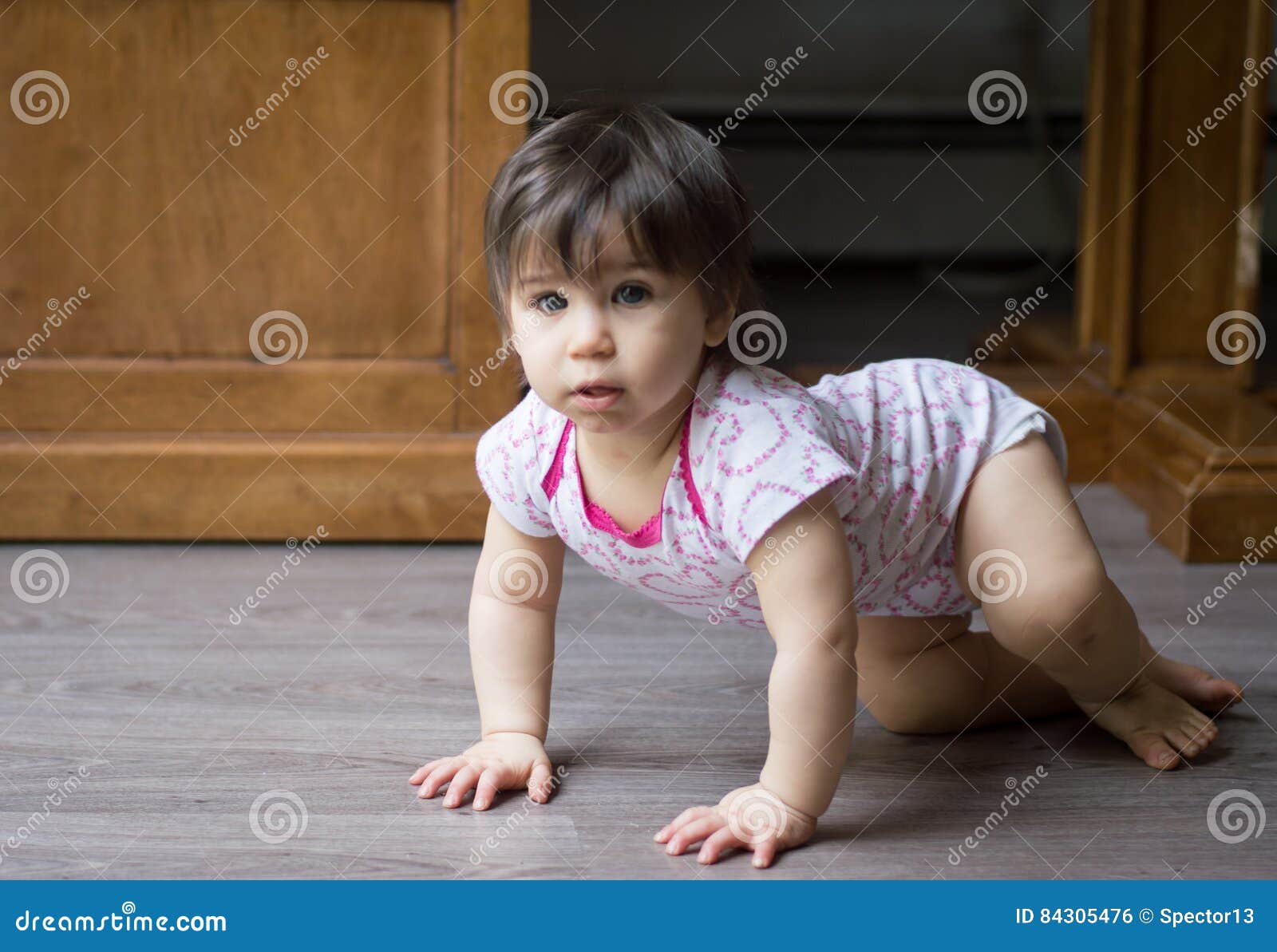 A Young Child Crawling on the Floor Stock Photo - Image of cute, pretty ...