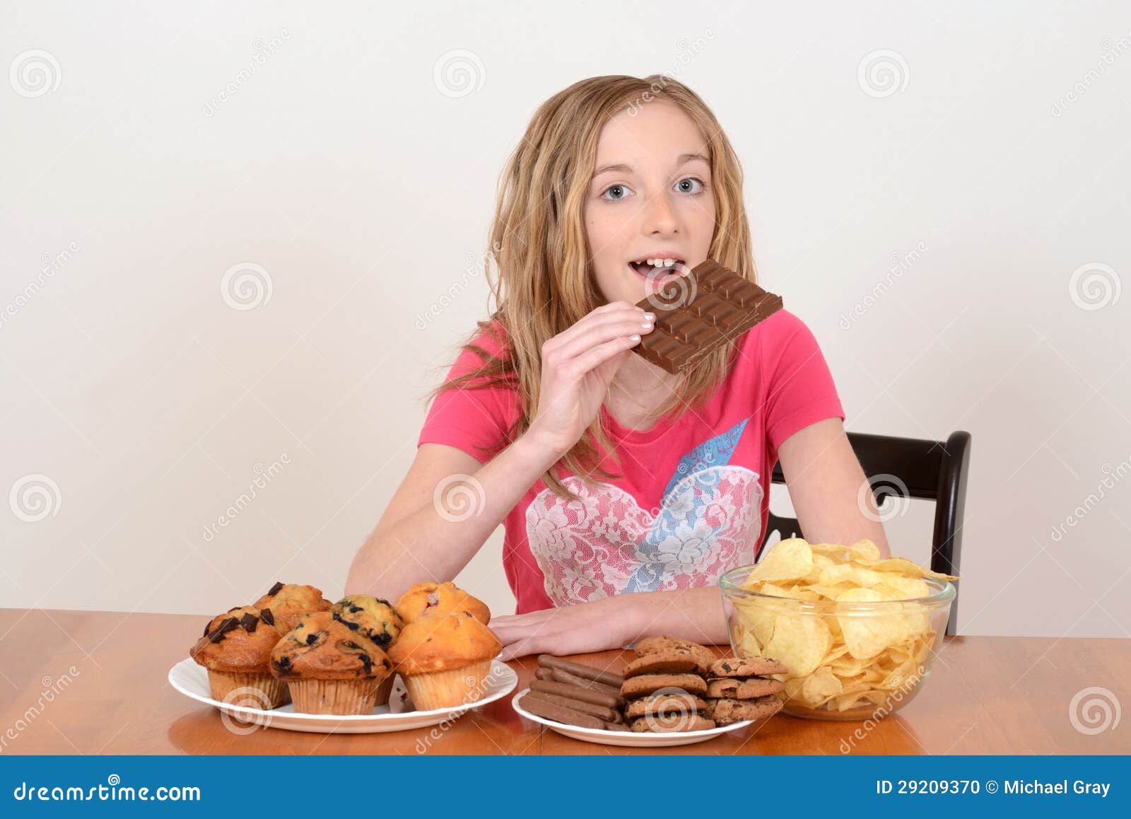 Young Child Eating Large Chocolate Bar Stock Photo - Image of dish ...