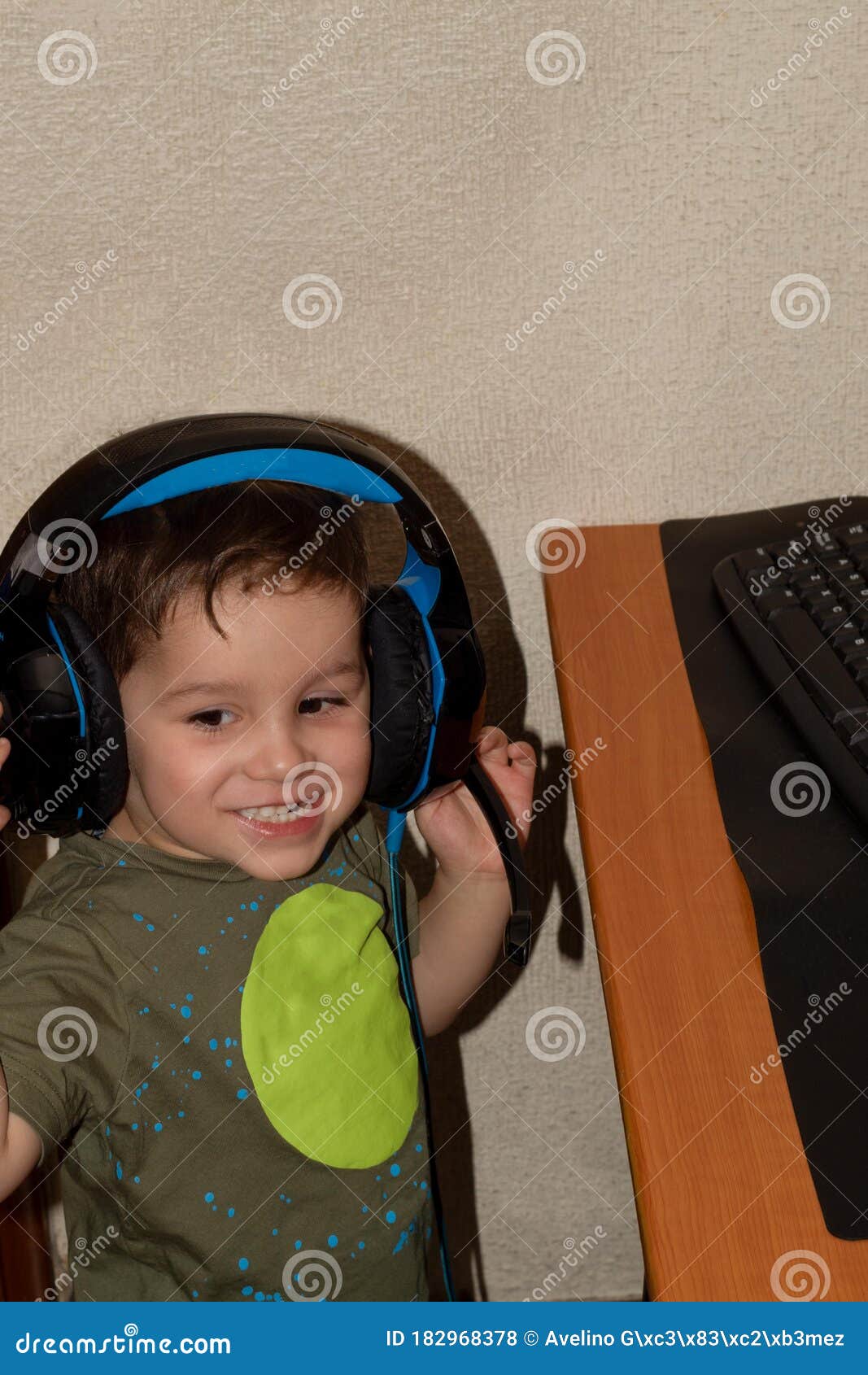 Young Child with Gaming Cases Stock Photo - Image of small, keyboard ...
