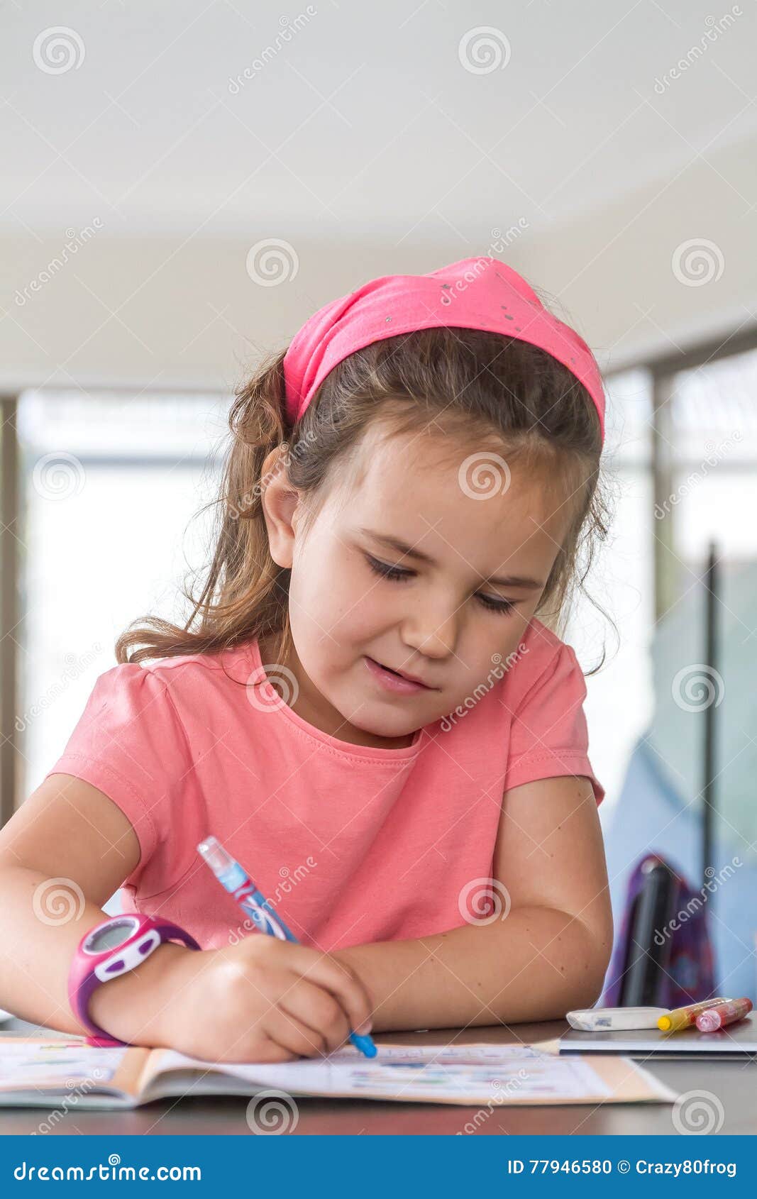 Young Child Girl Writing in Notebook Stock Photo - Image of face, apple ...
