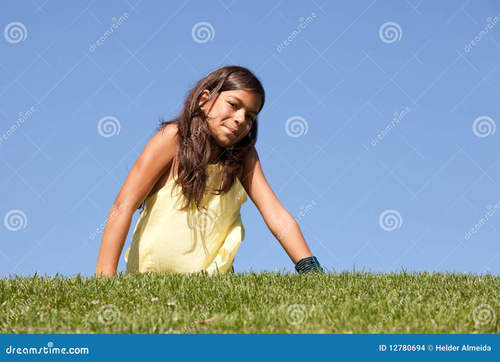 Young child on the grass stock photo. Image of laying - 12780694