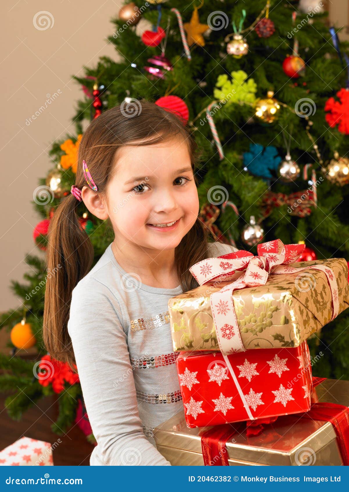 Young child holding gifts stock photo. Image of lifestyle - 20462382