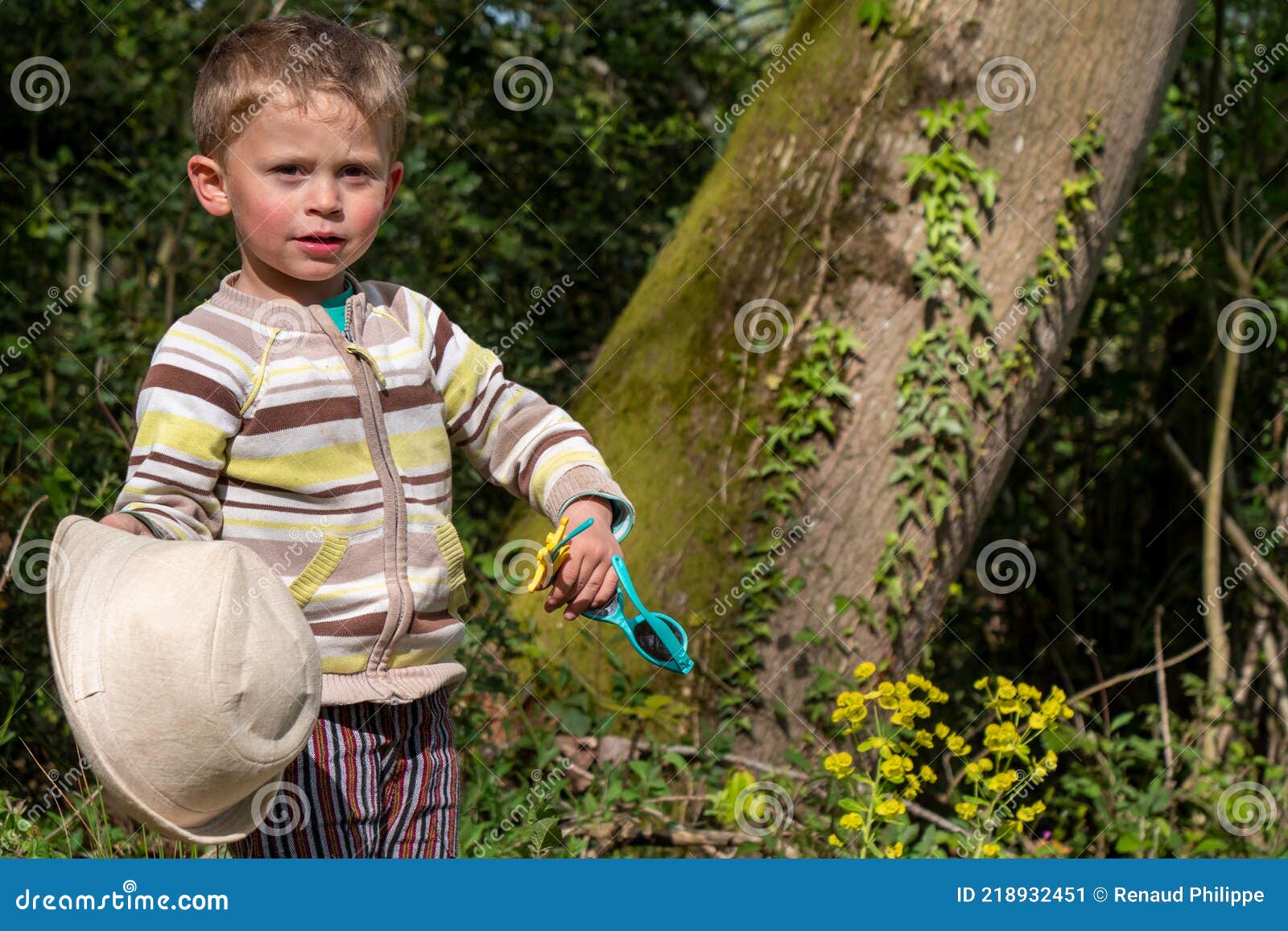 Young child in nature stock image. Image of outside - 218932451