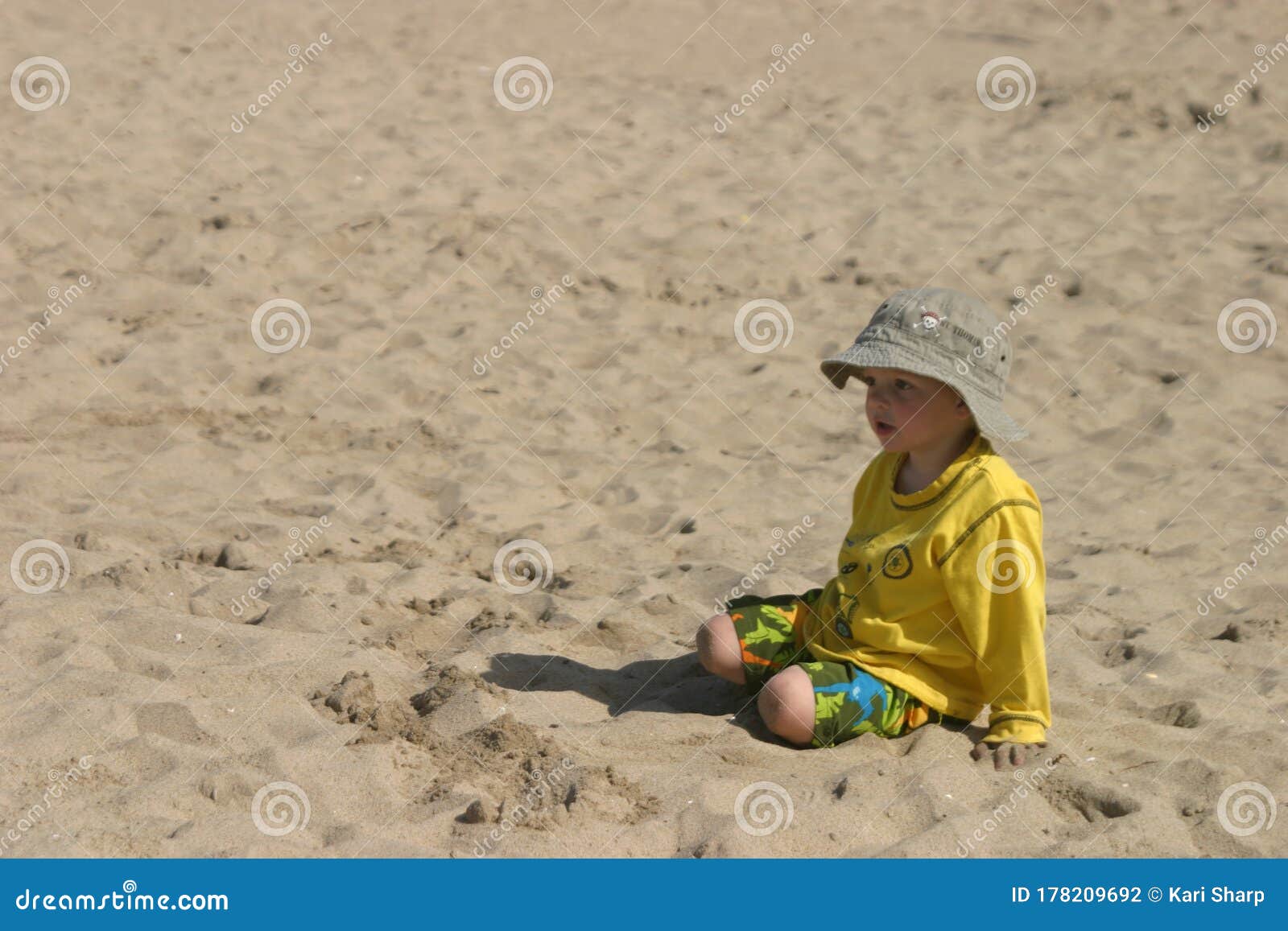 Young Child Playing in the Sand on the Beach Stock Photo - Image of ...