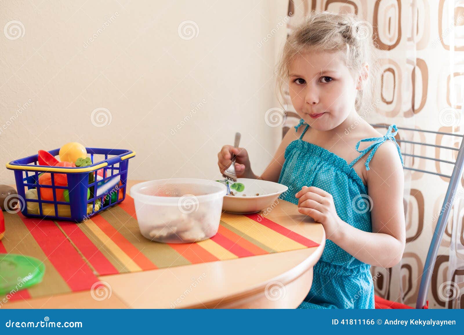 Young Child Plays with Toys at Table and Eating Stock Photo - Image of ...