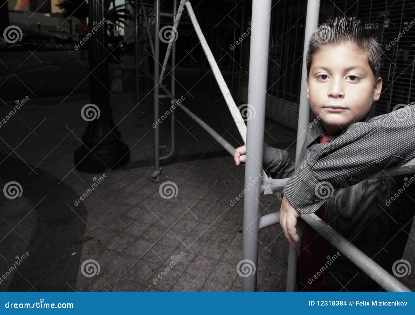Young Child Posing by Scaffolding Stock Photo - Image of single ...