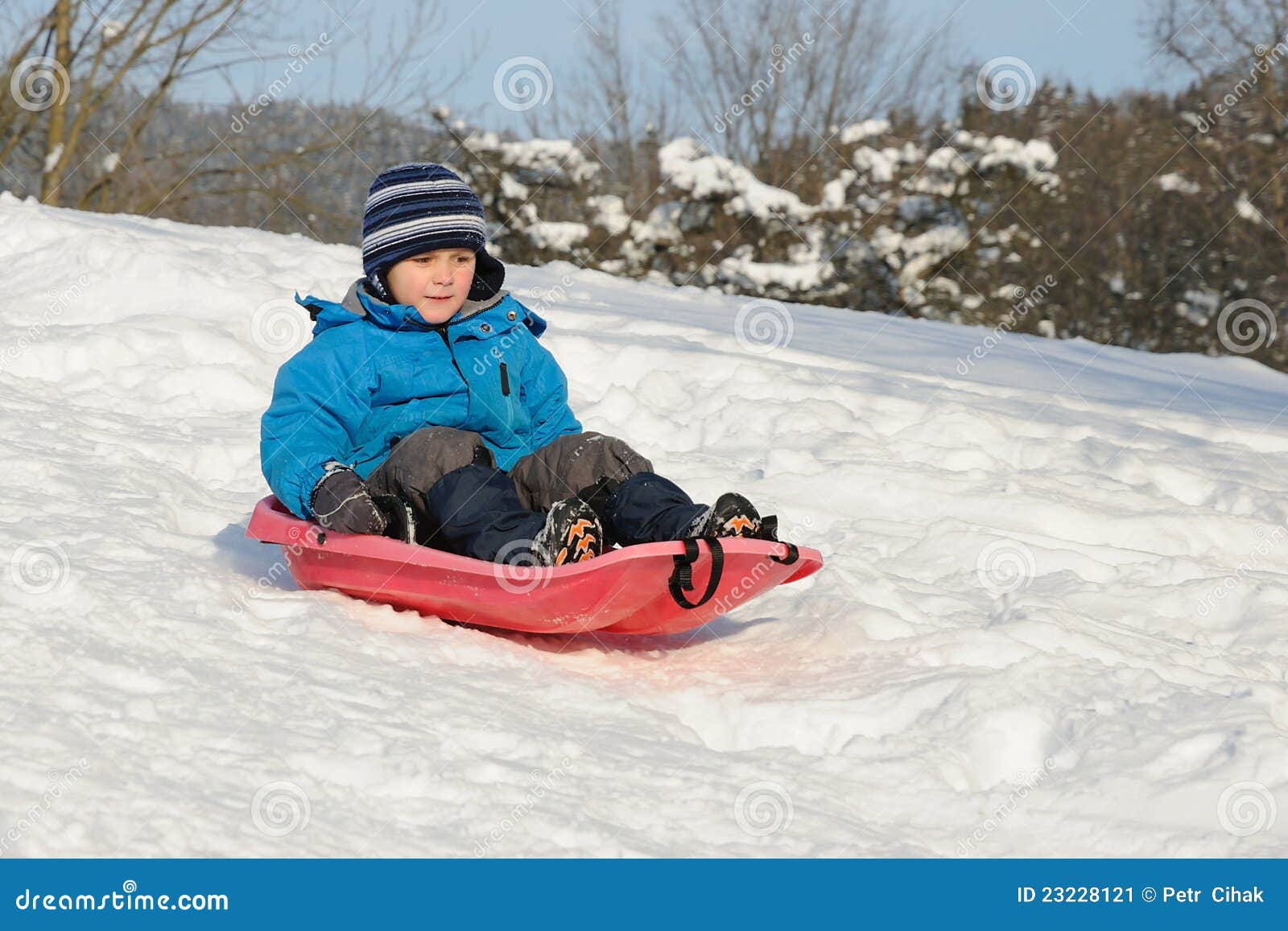 Young child on red sled stock image. Image of bobsled - 23228121