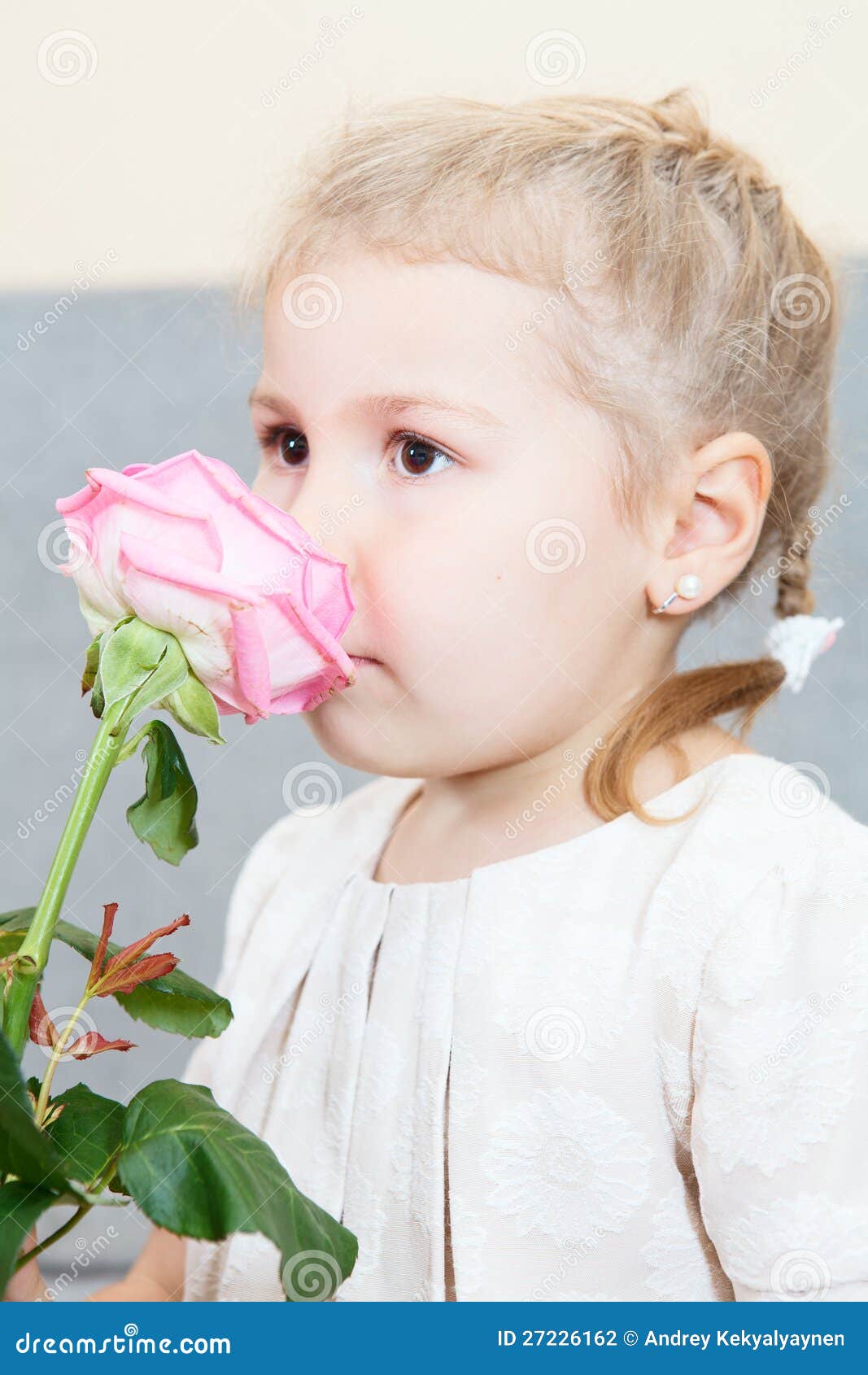 Young Child Smelling a Pink Rose Stock Photo - Image of eyes, little ...
