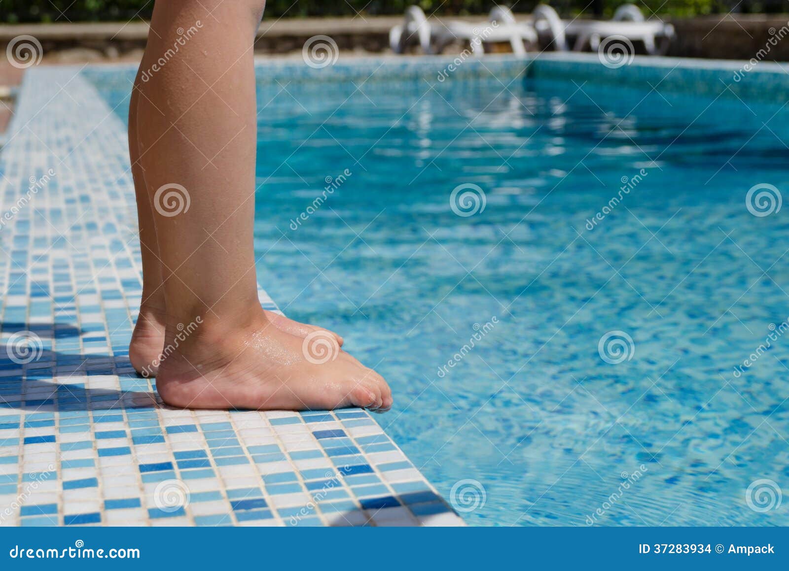 Young Child Standing at the Edge of a Pool Stock Photo - Image of ...