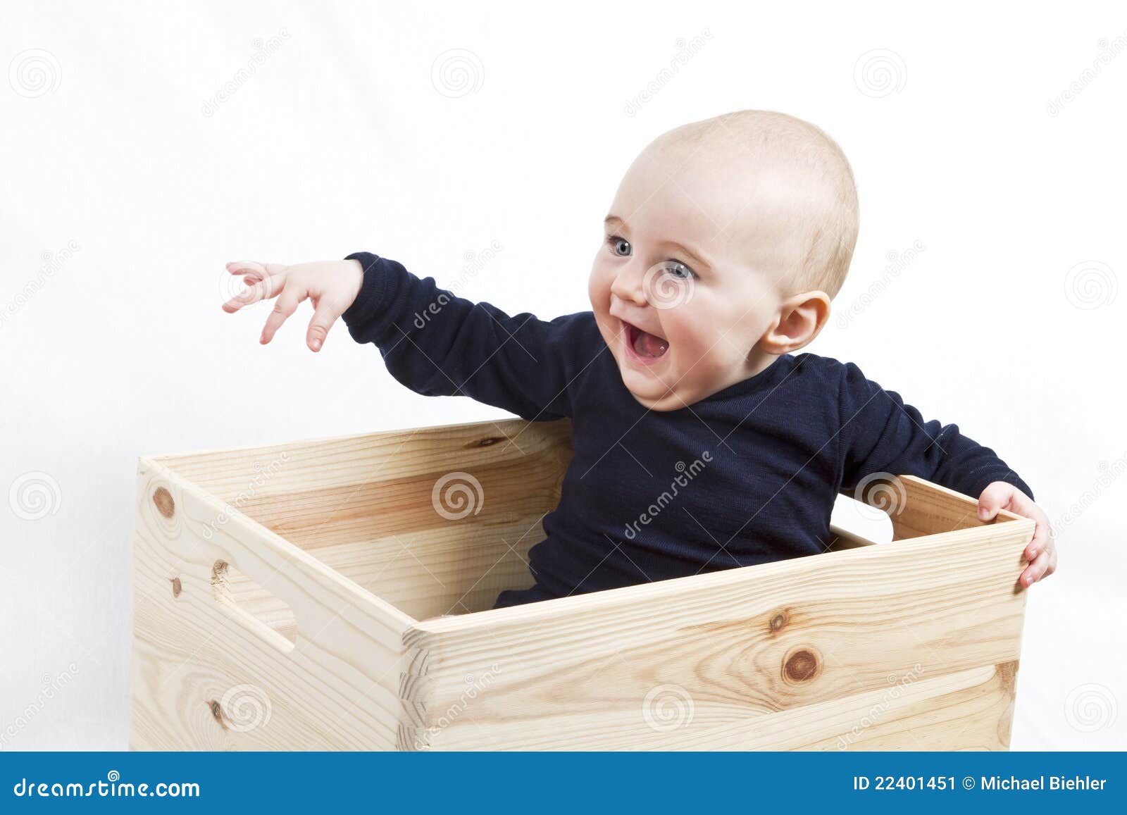 Young Child in Wooden Box Pointing To the Left Stock Image - Image of ...