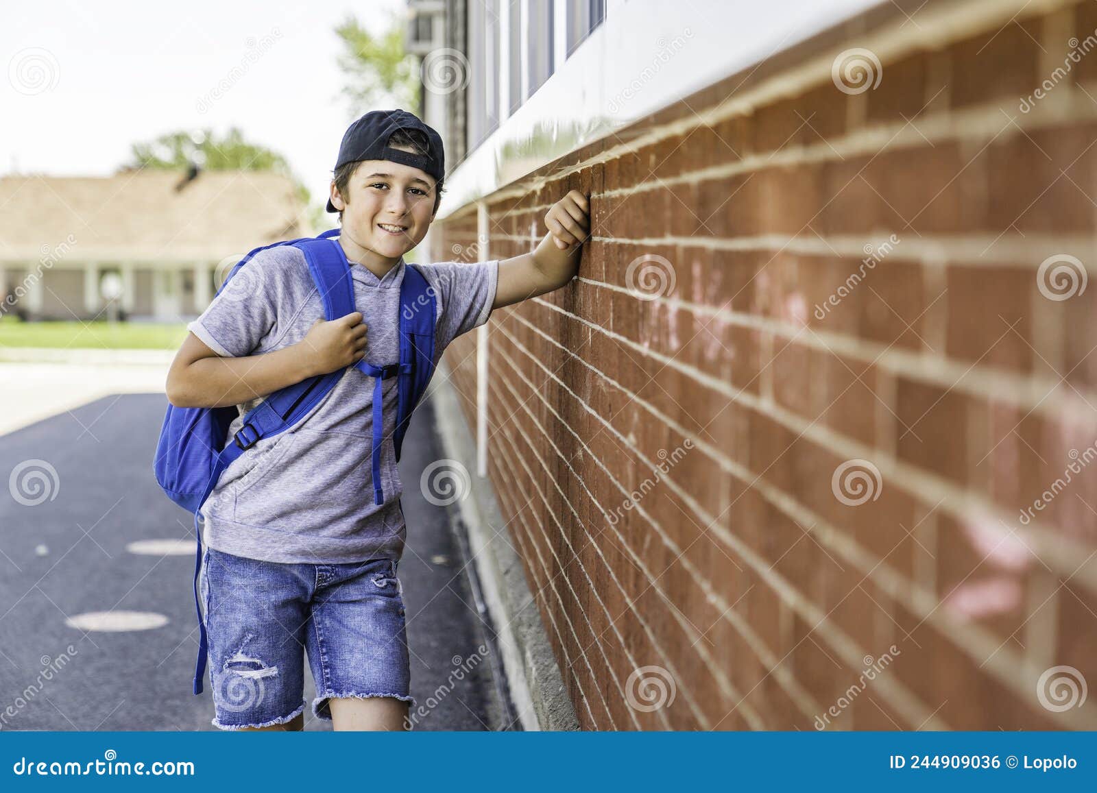 Young Children Boy on the School Playground with Backpack Stock Photo ...
