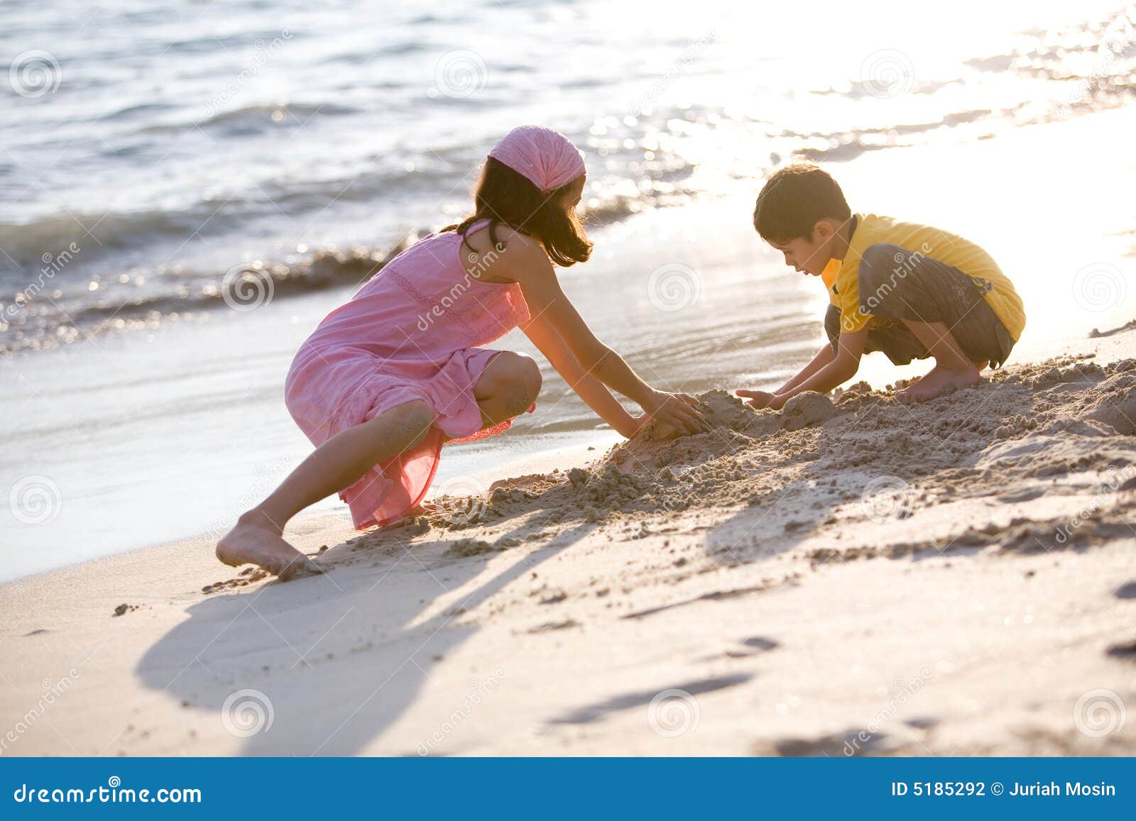 Young Children Making Sand Castle Stock Photo - Image of sand, female ...