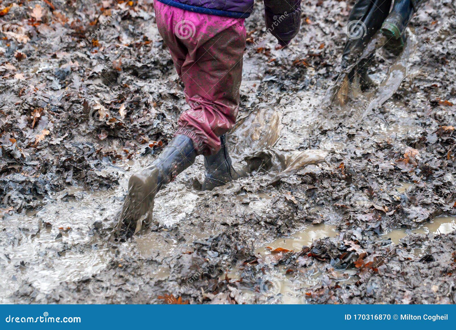 Young Children Playing in a Mud Puddle Stock Photo - Image of outside ...