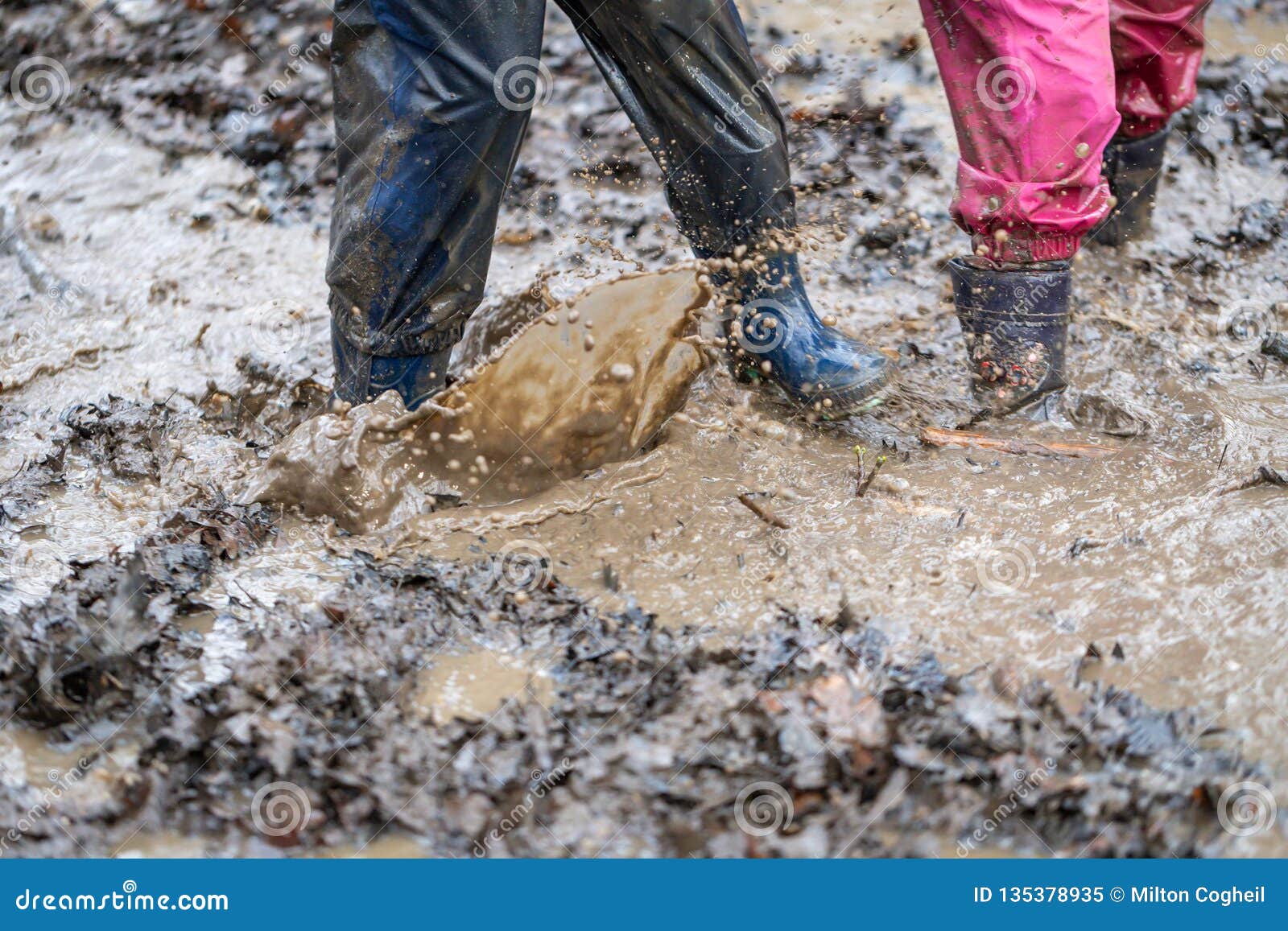 Playing in Mud stock image. Image of boots, play, park - 135378935