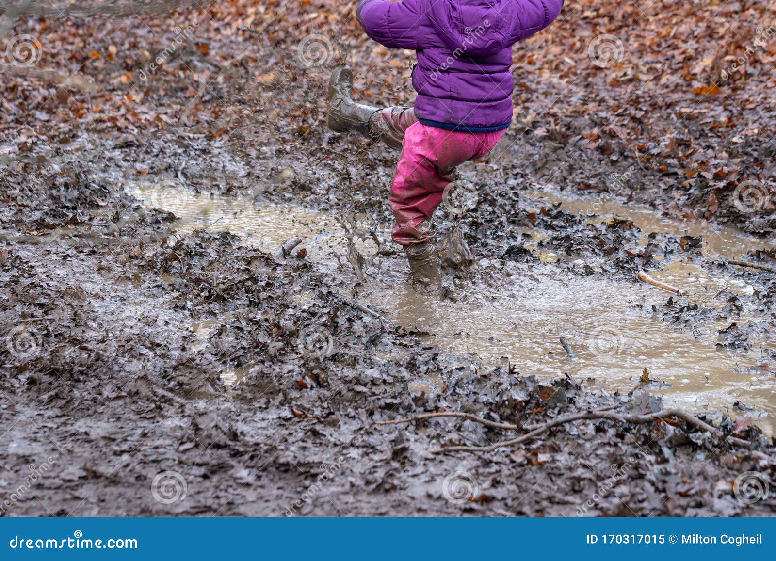 Young Children Playing in a Mud Puddle Stock Image - Image of autumn ...