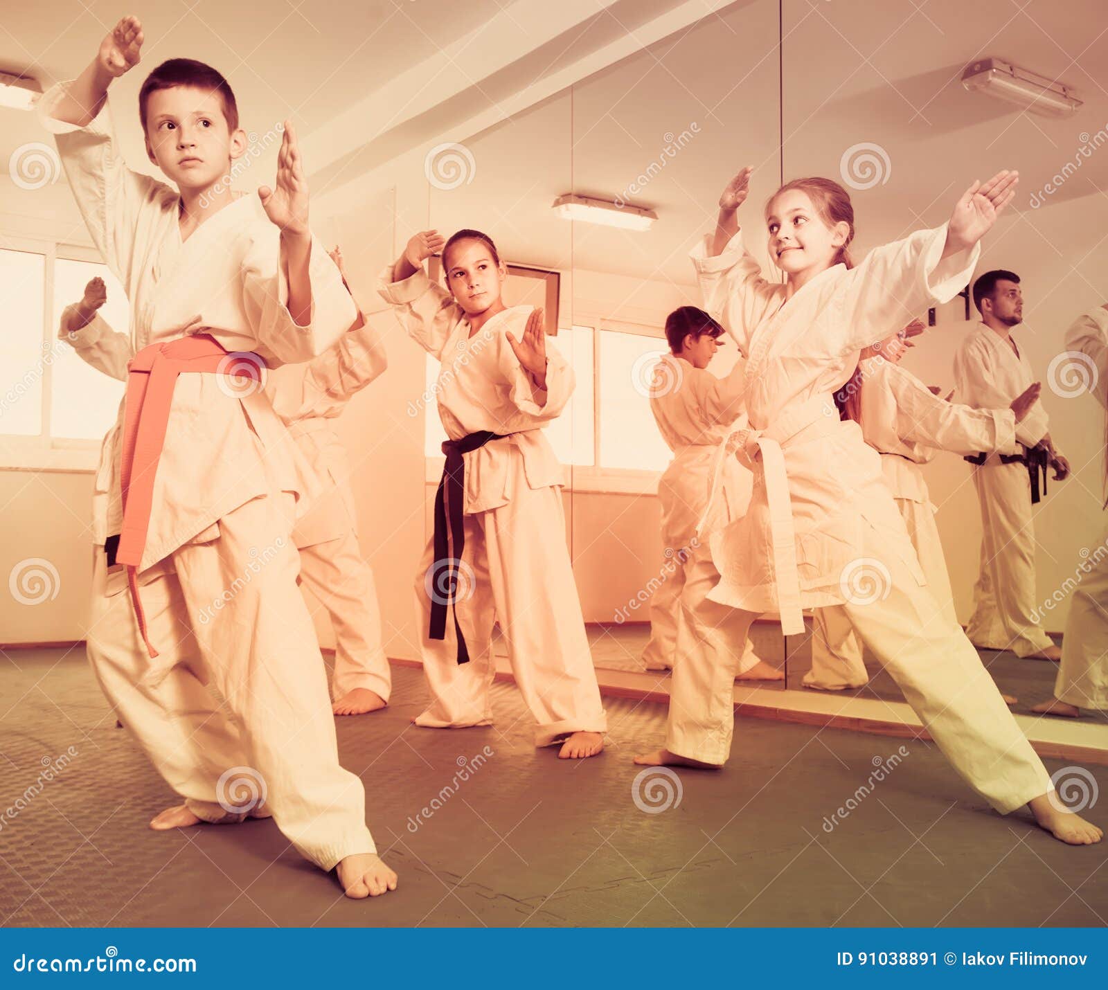 Young Children Practicing Karate Moves Stock Image - Image of ...