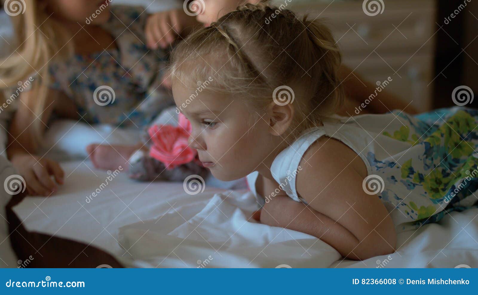 Young Children Sitting on the Bed Stock Photo - Image of attractive ...