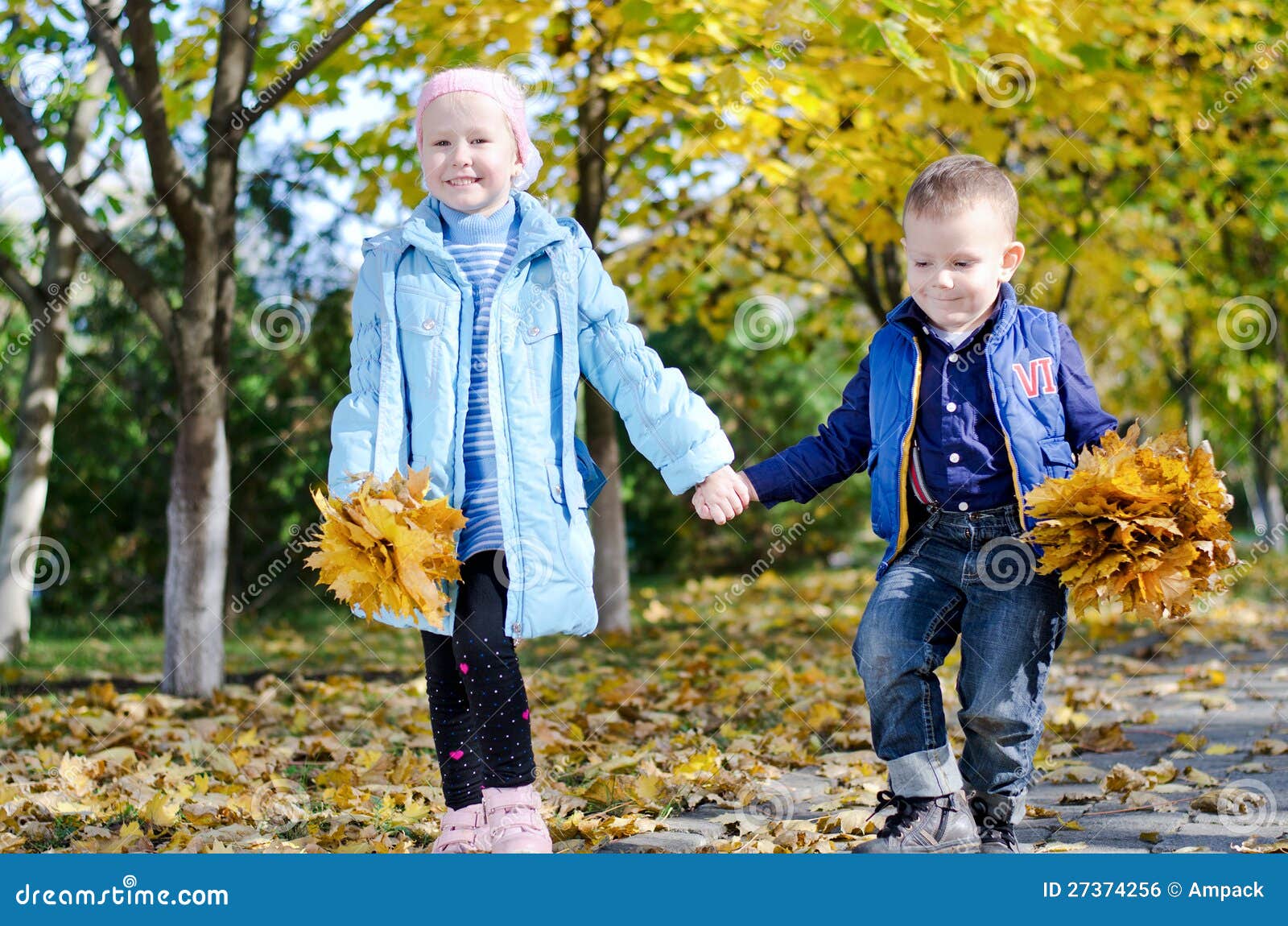 Young Children Skipping Hand in Hand Stock Photo - Image of play, cute ...