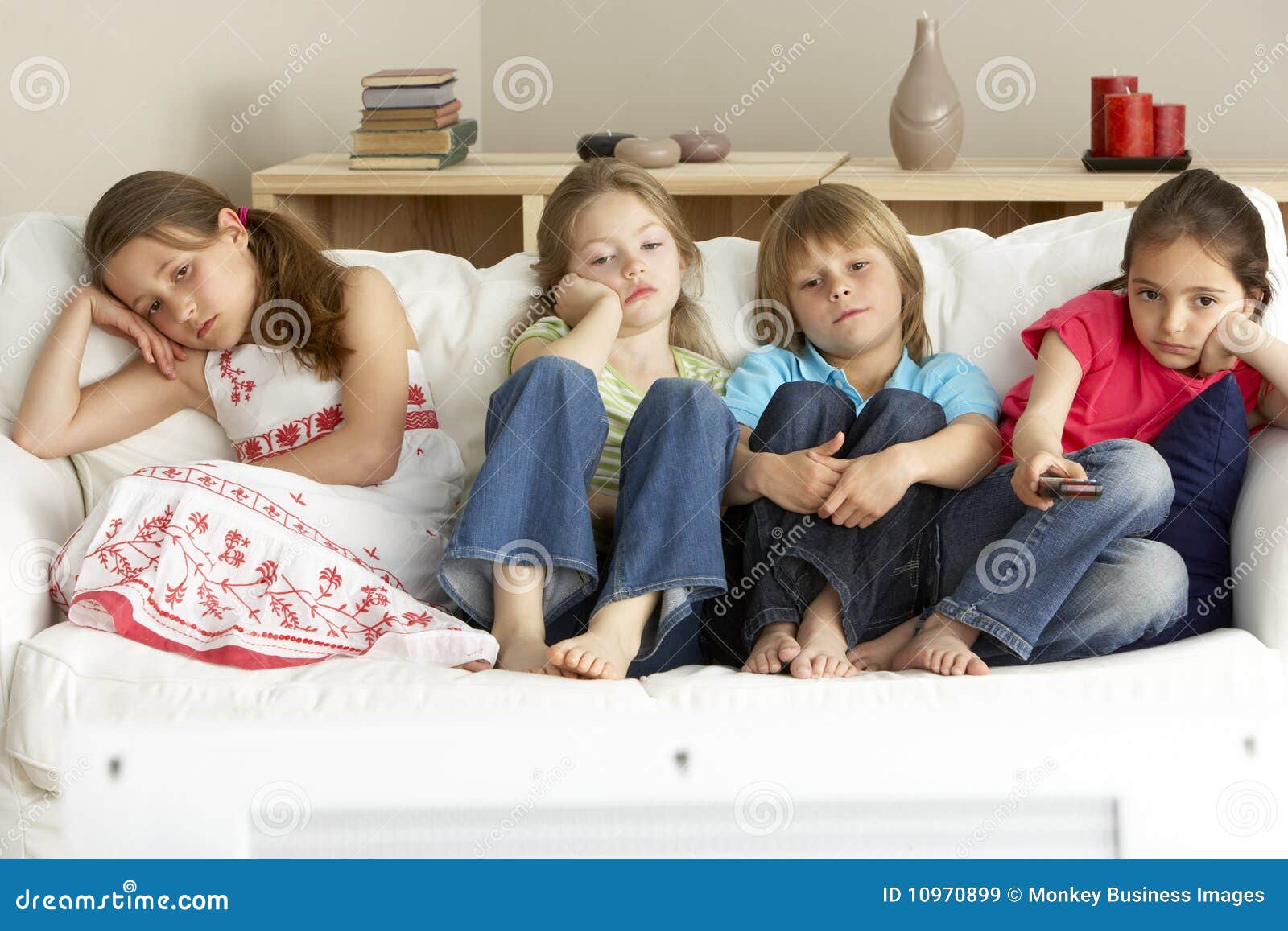 Young Television Addict Man Sitting On Home Sofa Watching TV And Eating ... Young Television Addict Man Sitting On Home Sofa Watching TV And Eating ...