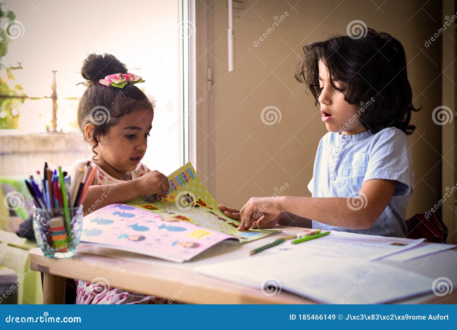 Young Children Working at Home Stock Image - Image of children ...