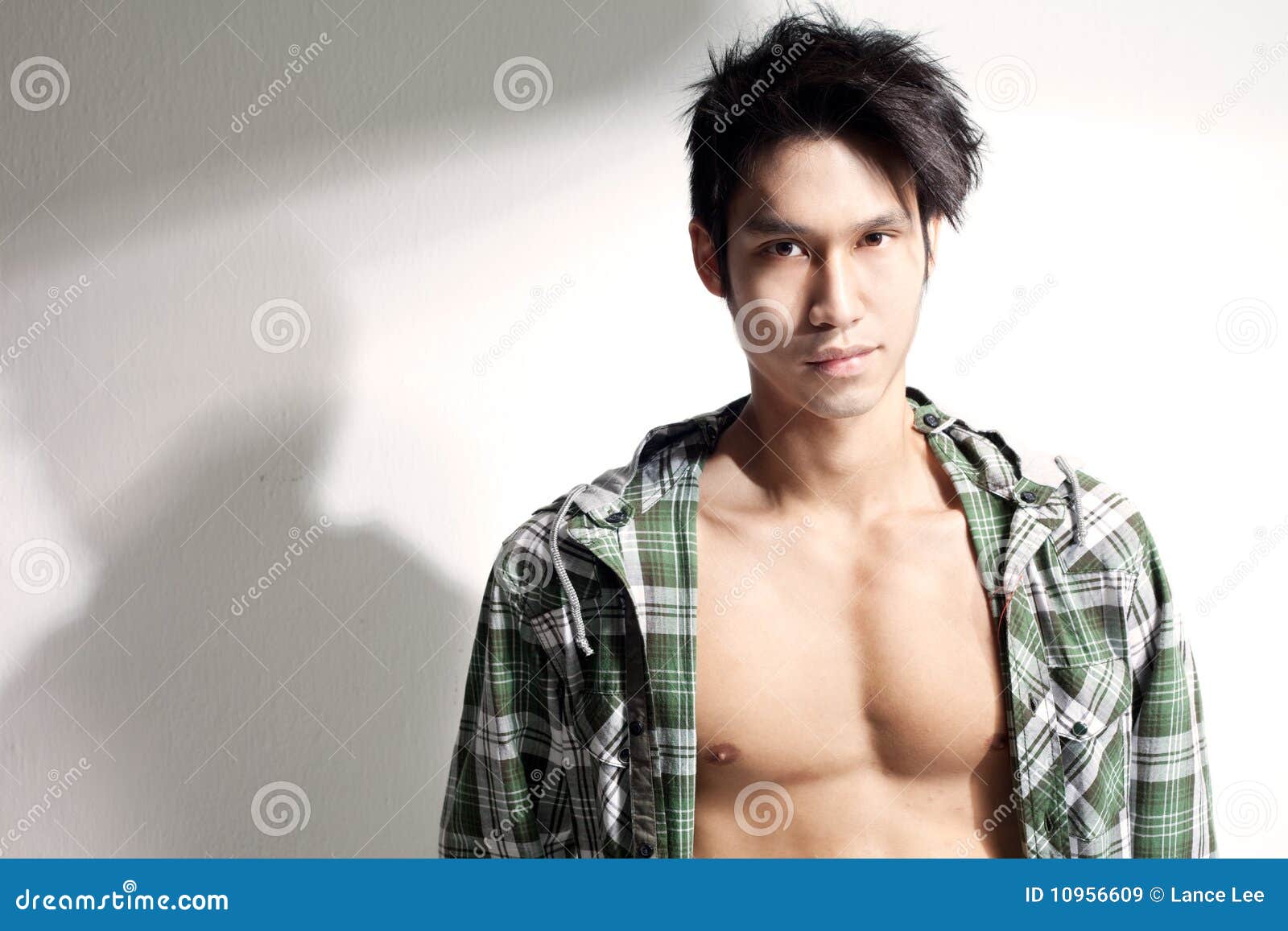 Young Chinese Male Model Baring Chest, Attitude Stock Image - Image of ...