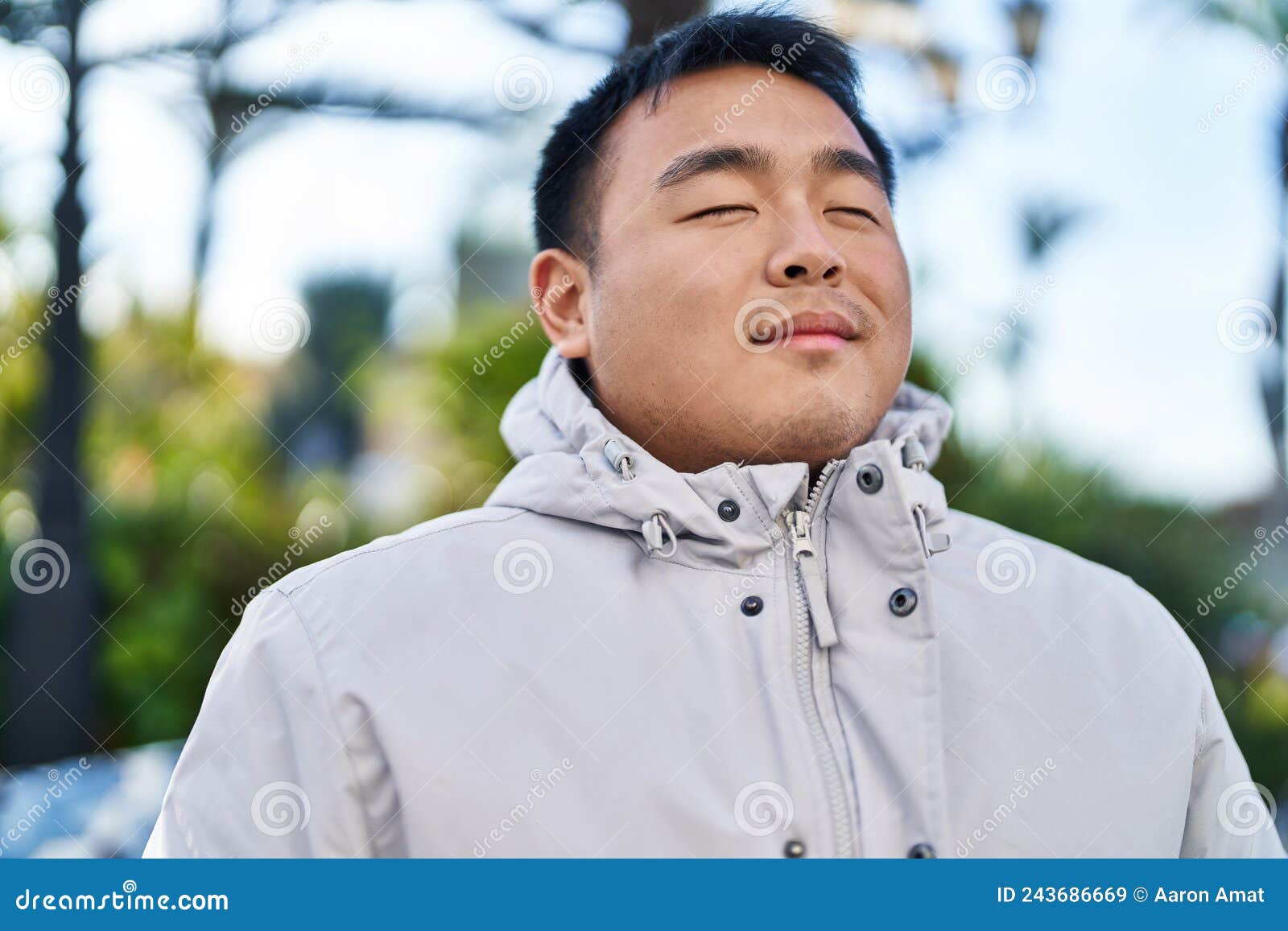 Young Chinese Man Breathing Standing at Park Stock Image - Image of ...
