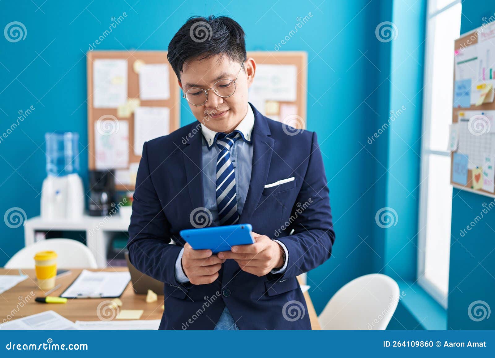 Young Chinese Man Business Worker Smiling Confident Using Touchpad at ...