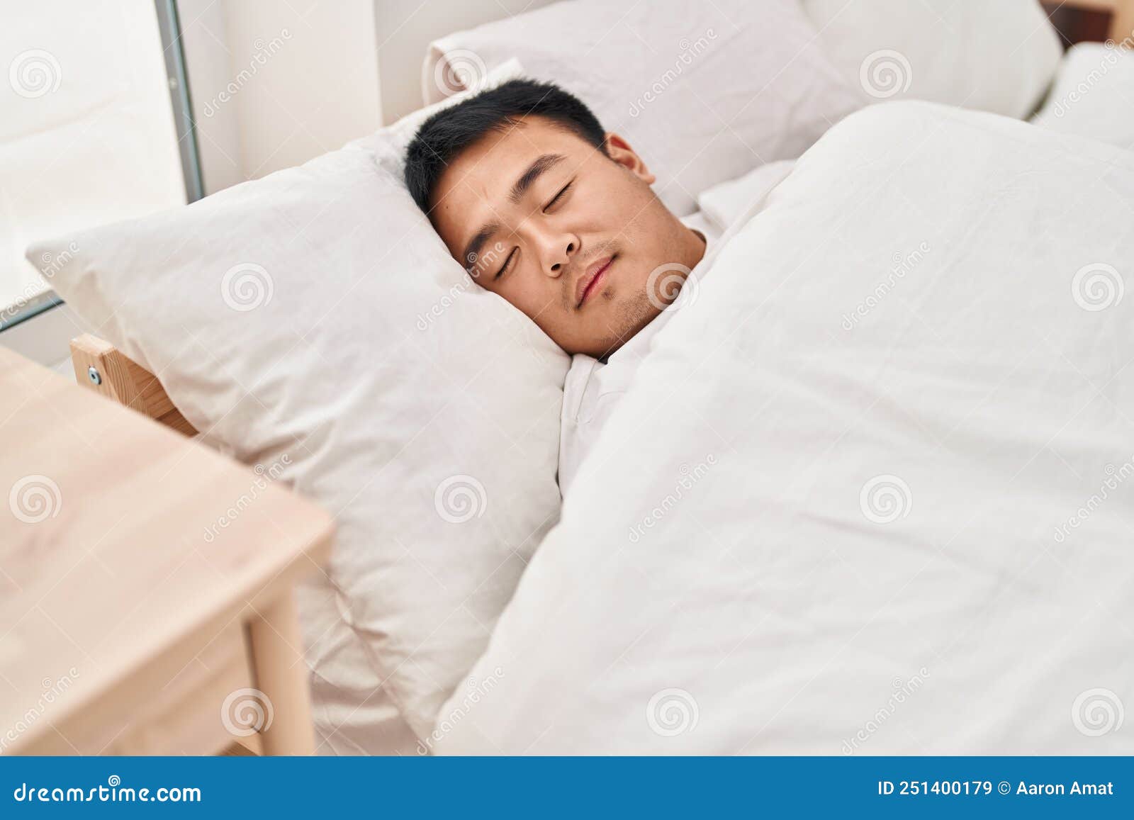 Young Chinese Man Lying on Bed Sleeping at Bedroom Stock Image - Image ...