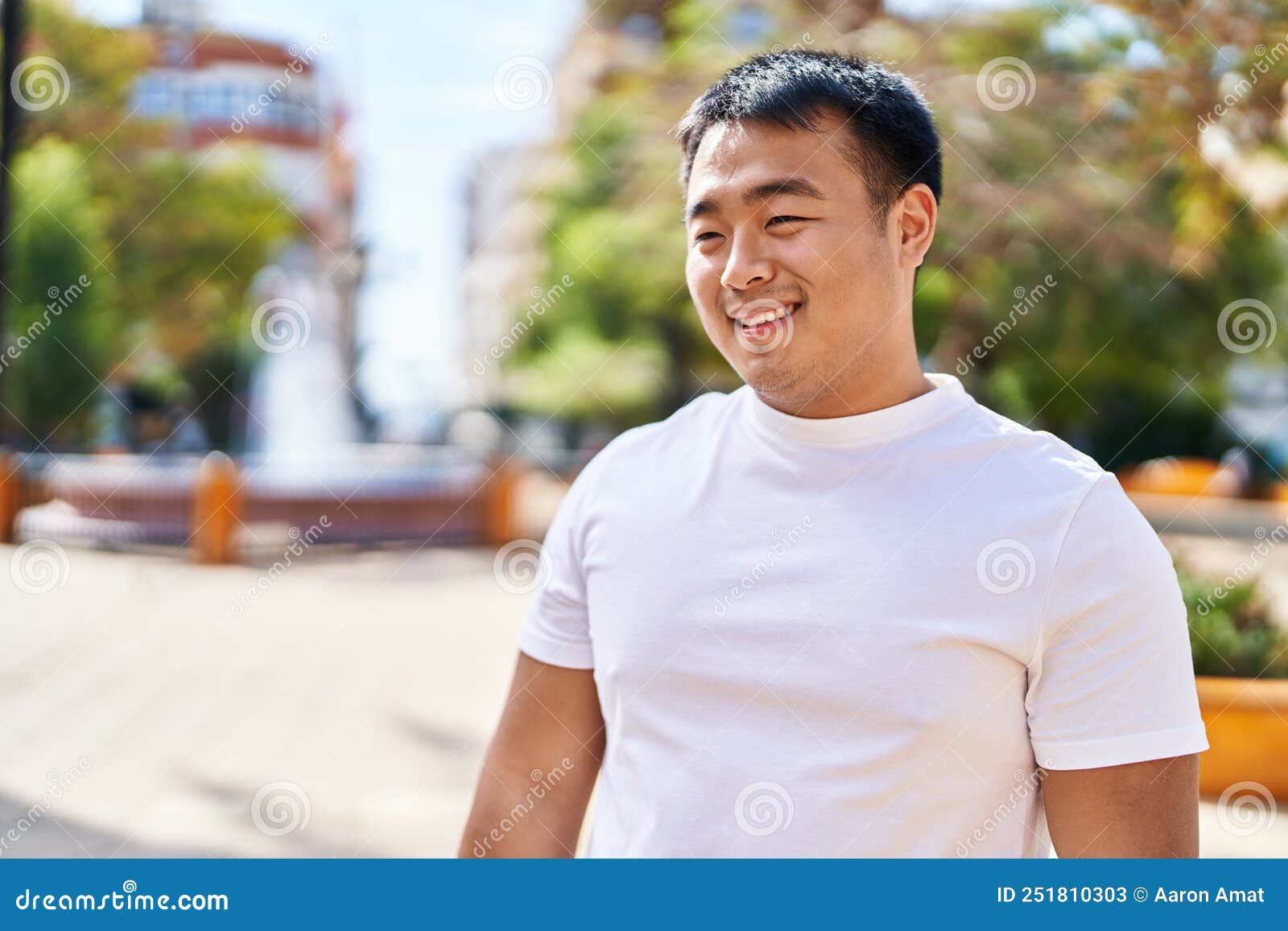 Young Chinese Man Smiling Confident Standing at Park Stock Image ...