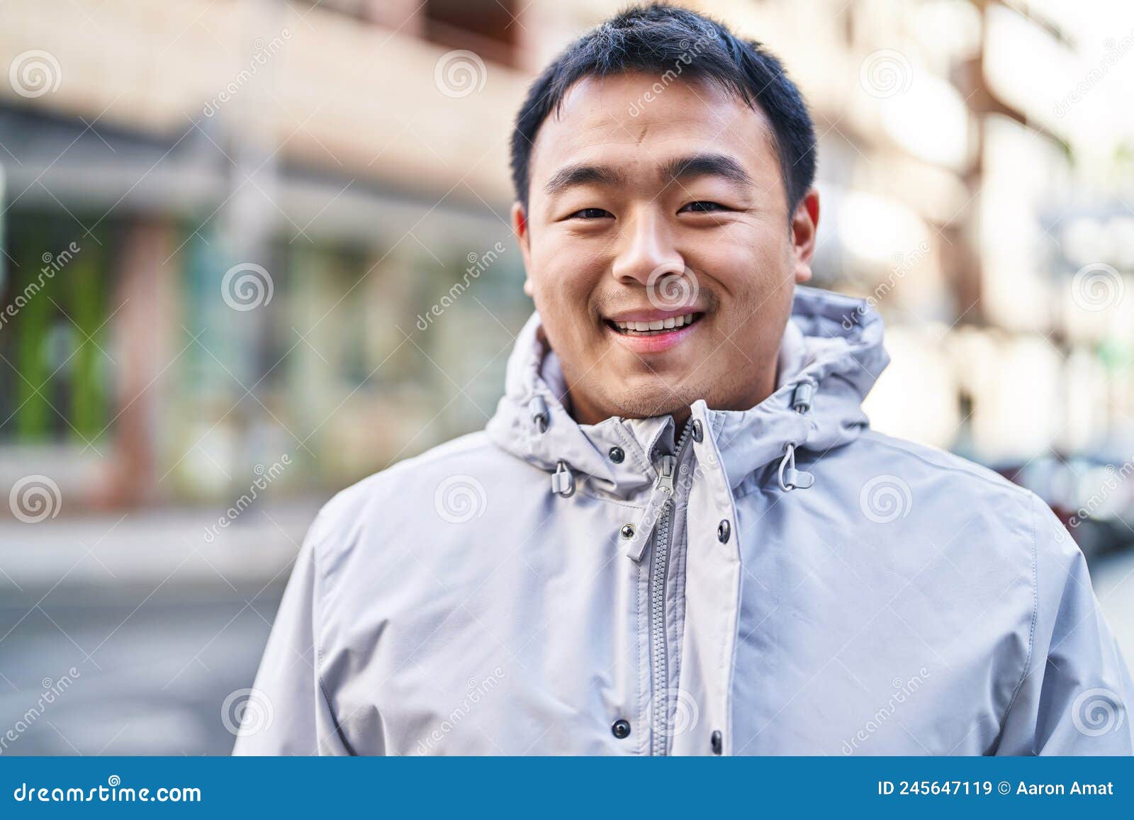 Young Chinese Man Smiling Confident Standing at Street Stock Image ...