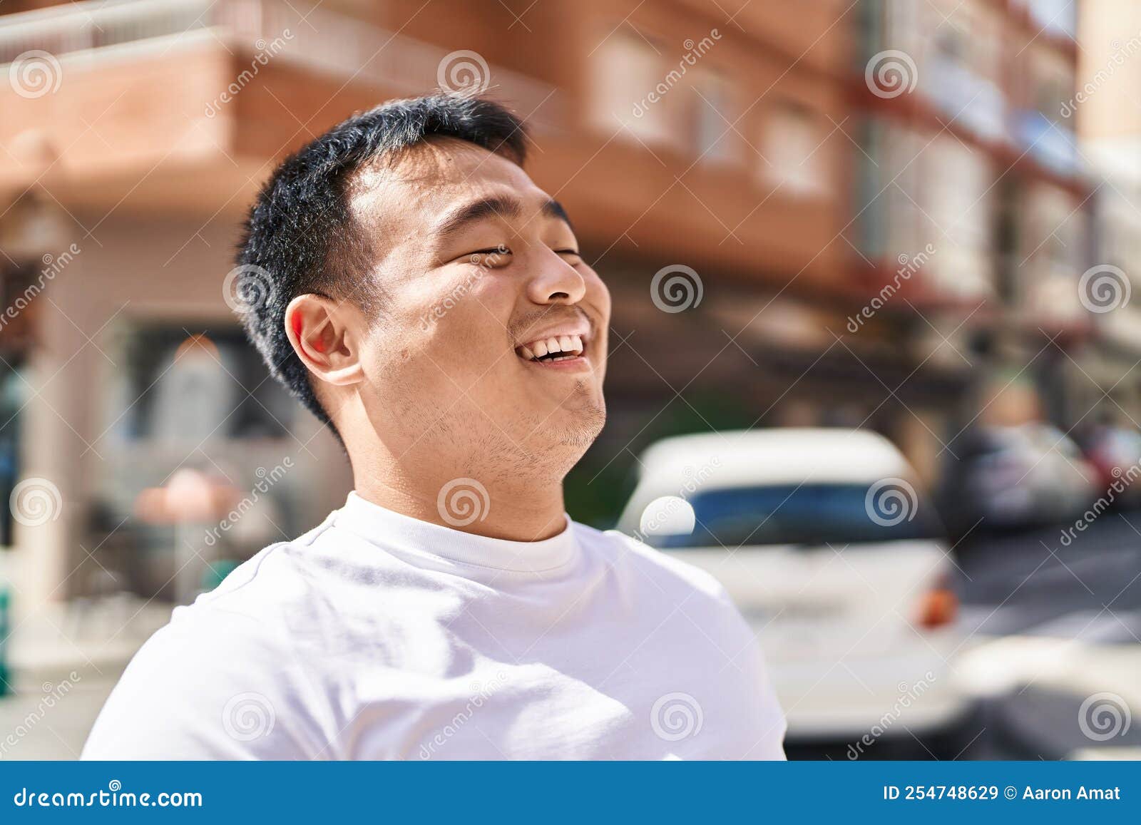 Young Chinese Man Smiling Confident Standing at Street Stock Image ...