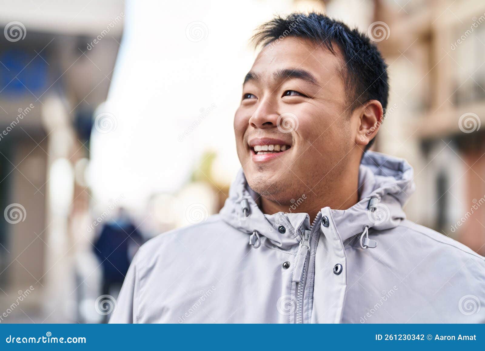 Young Chinese Man Smiling Confident Standing at Street Stock Photo ...