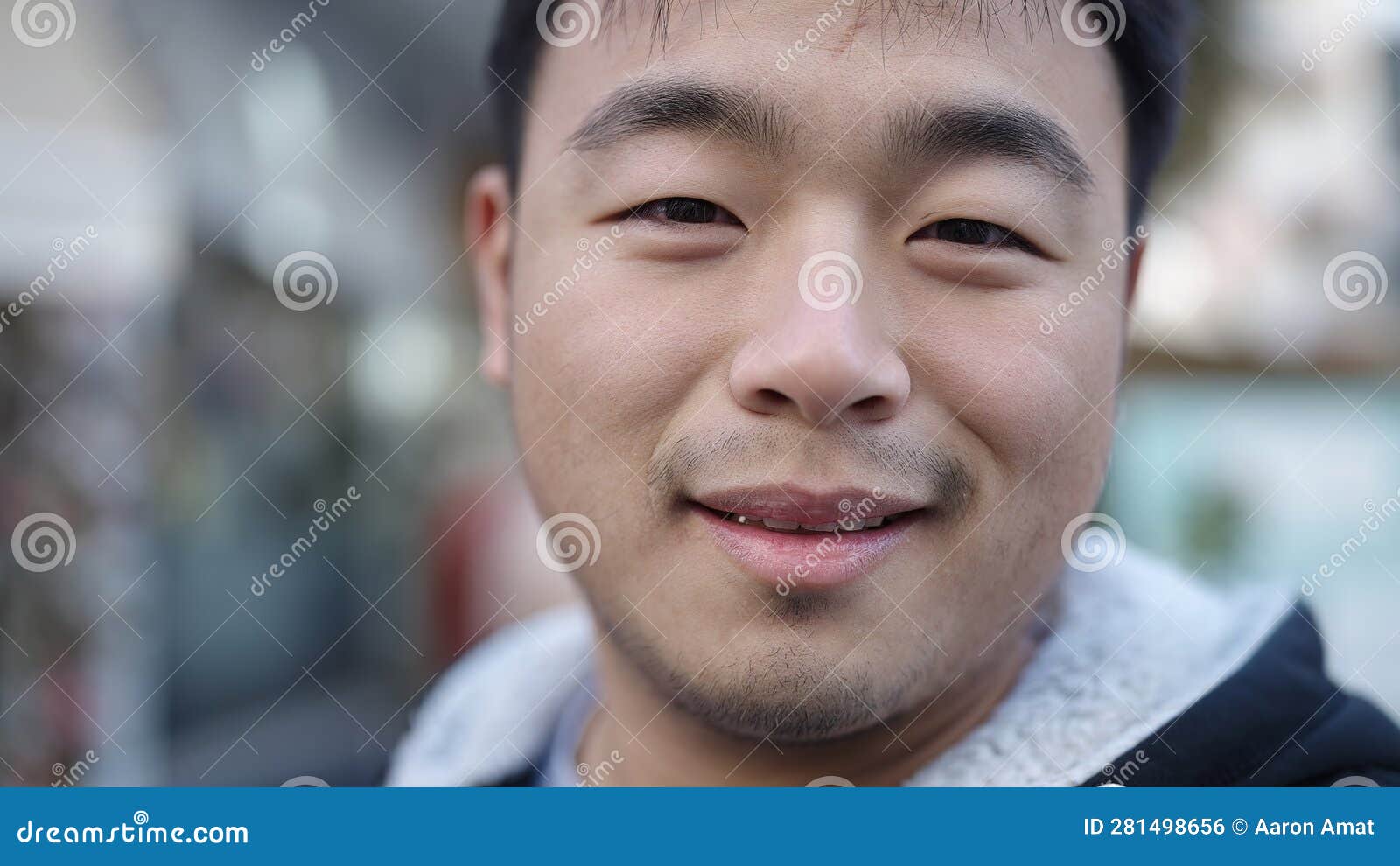 Young Chinese Man Smiling Confident Standing at Street Stock Photo ...