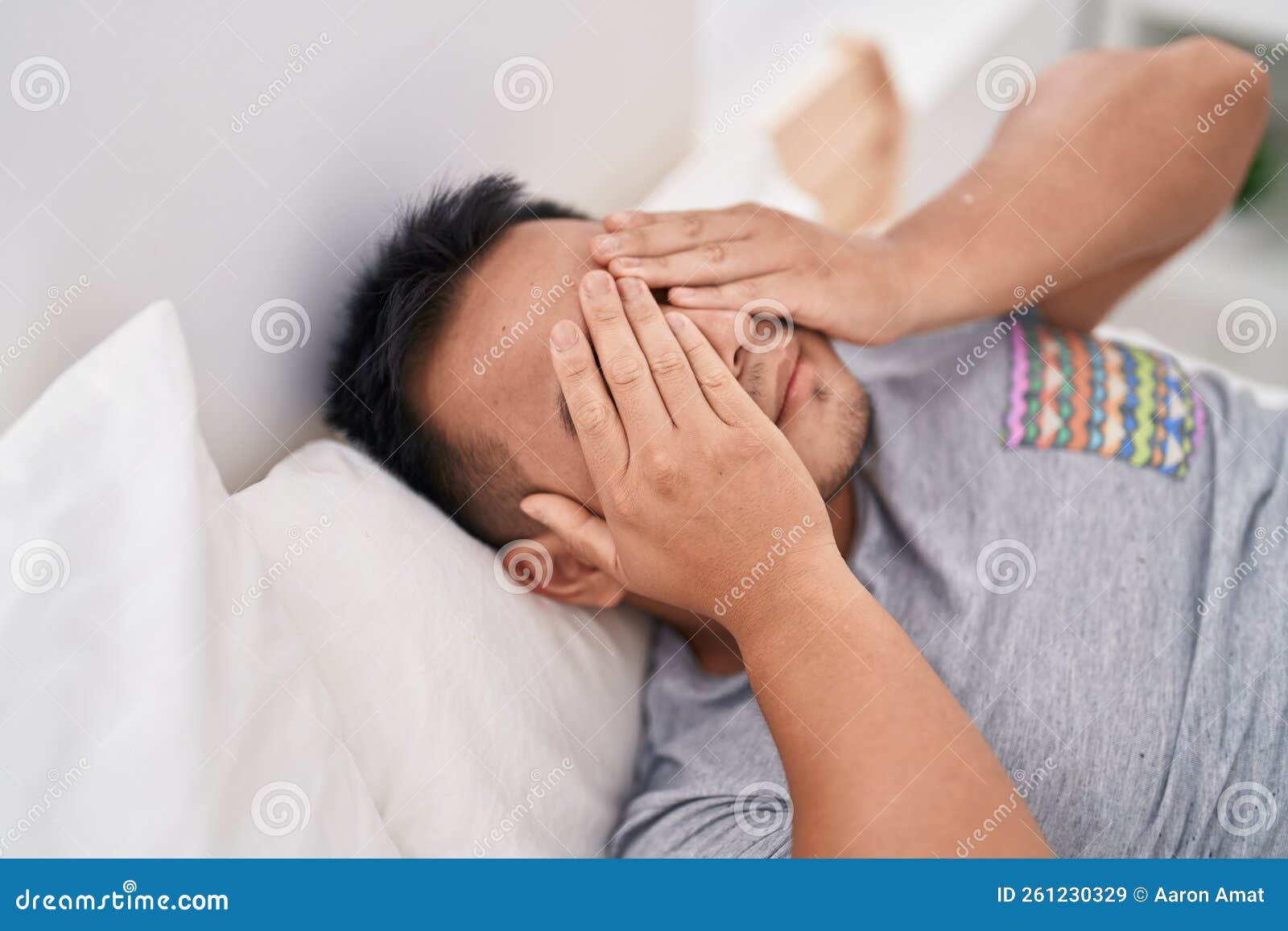 Young Chinese Man Stressed Lying on Bed at Bedroom Stock Image - Image ...