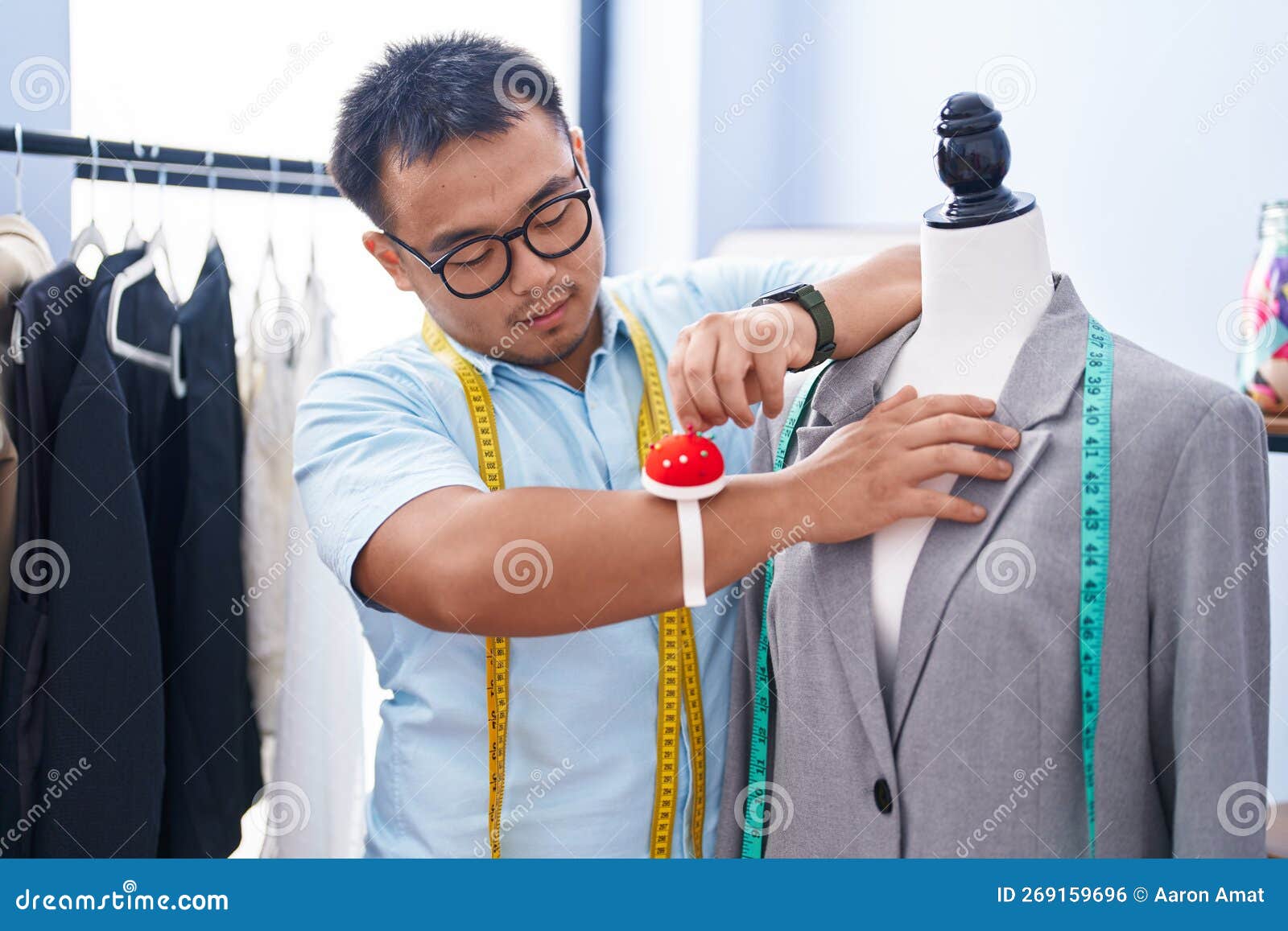 Young Chinese Man Tailor Measuring Jacket at Tailor Shop Stock Photo ...