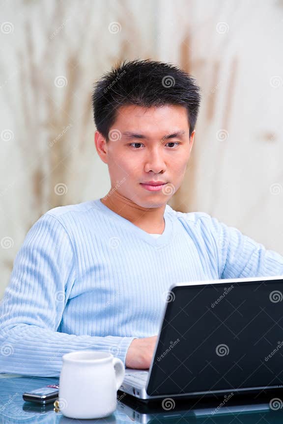 Young Chinese Man Using Laptop Stock Photo - Image of technology ...