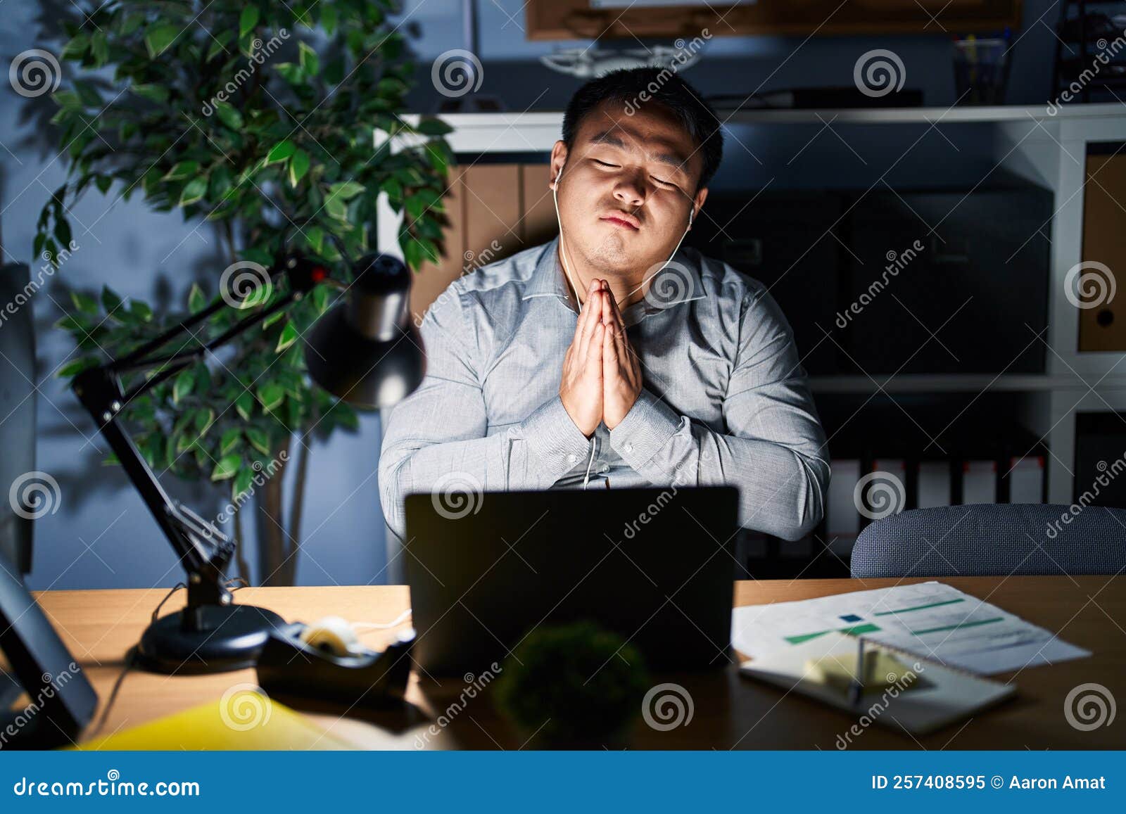 Young Chinese Man Working Using Computer Laptop at Night Begging and ...